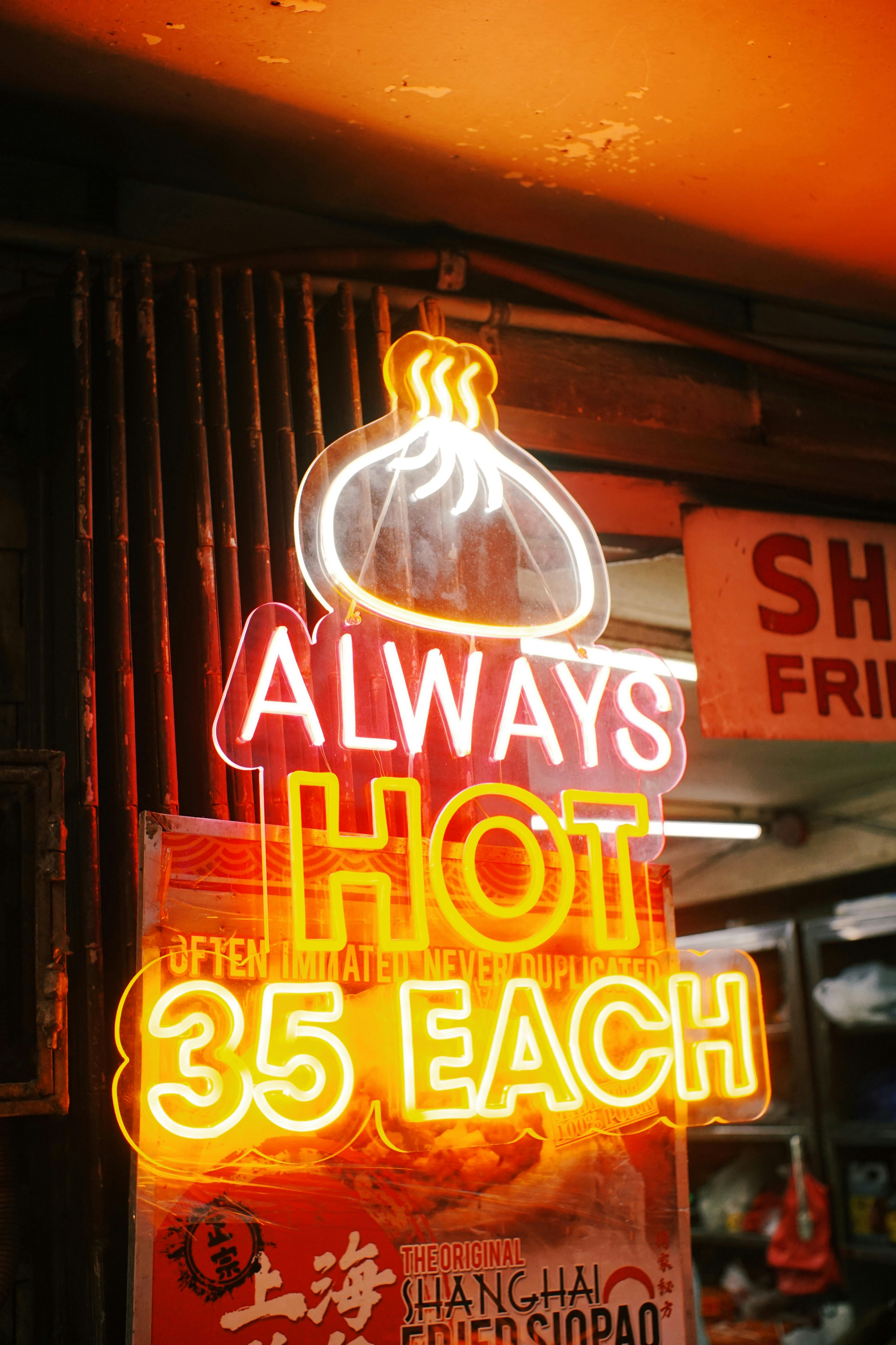 Neon Sign Advertising Hot Dumplings · Free Stock Photo