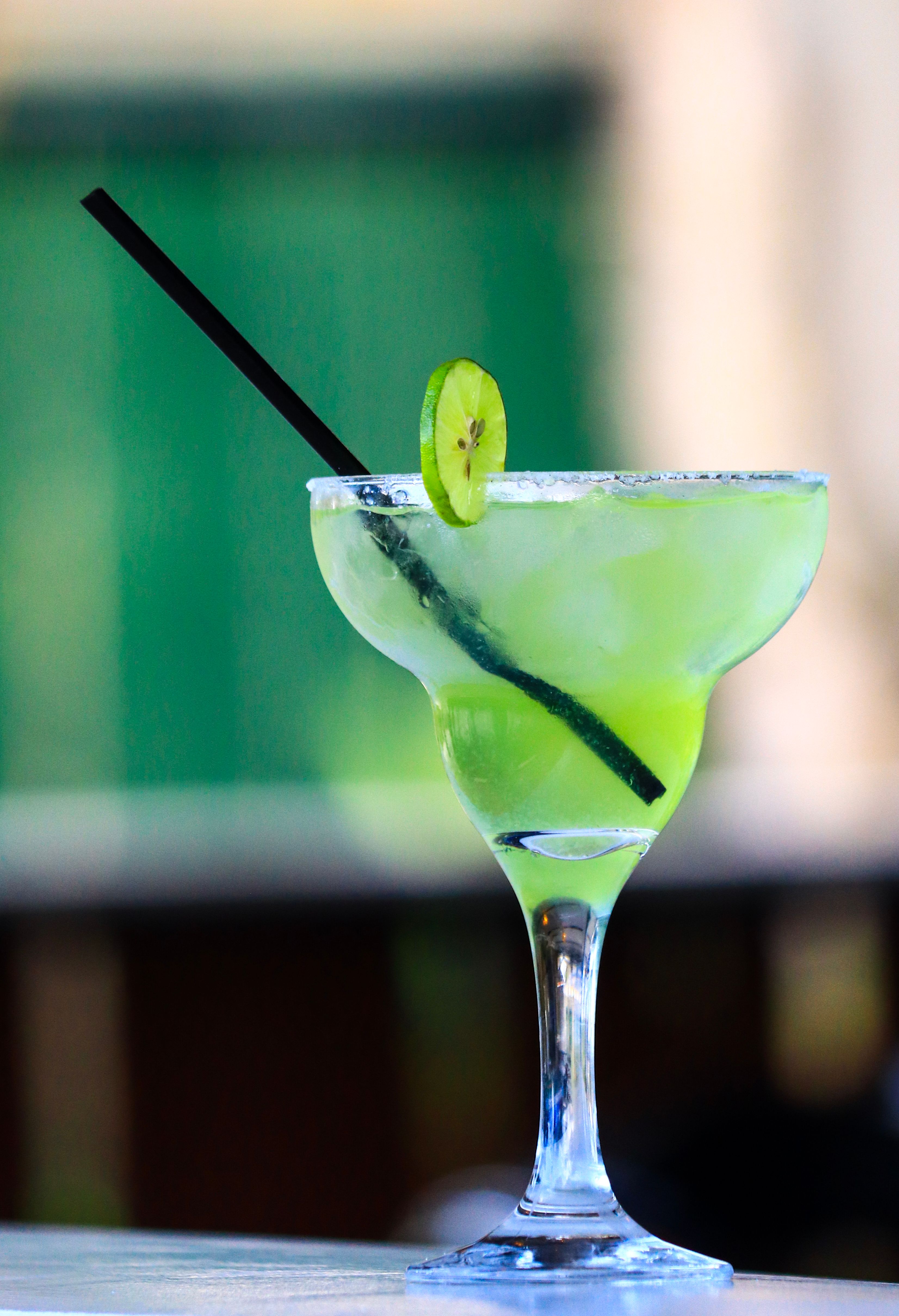 Refreshing Green Cocktail with Lime Garnish · Free Stock Photo