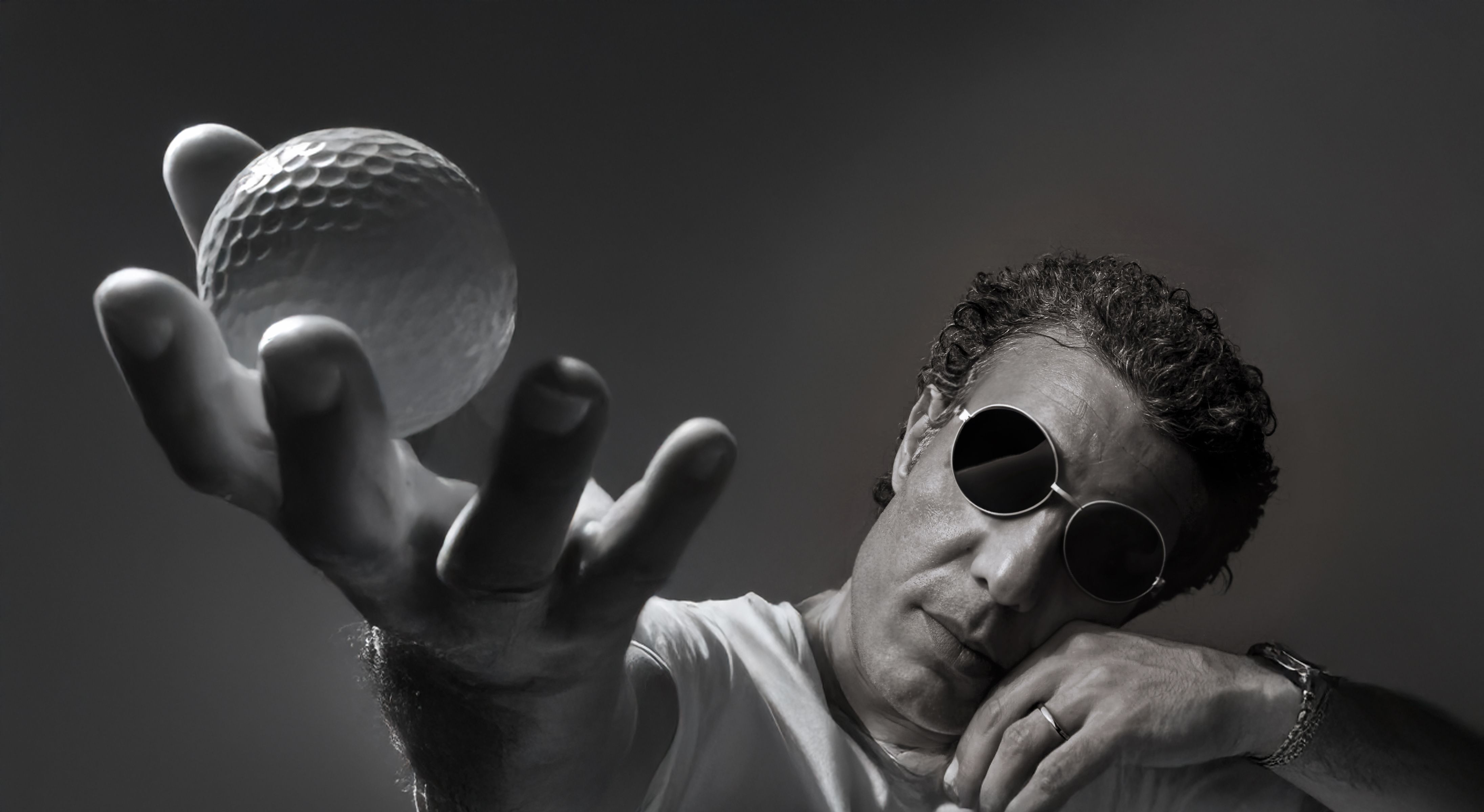 Black and White Portrait with Golf Ball · Free Stock Photo
