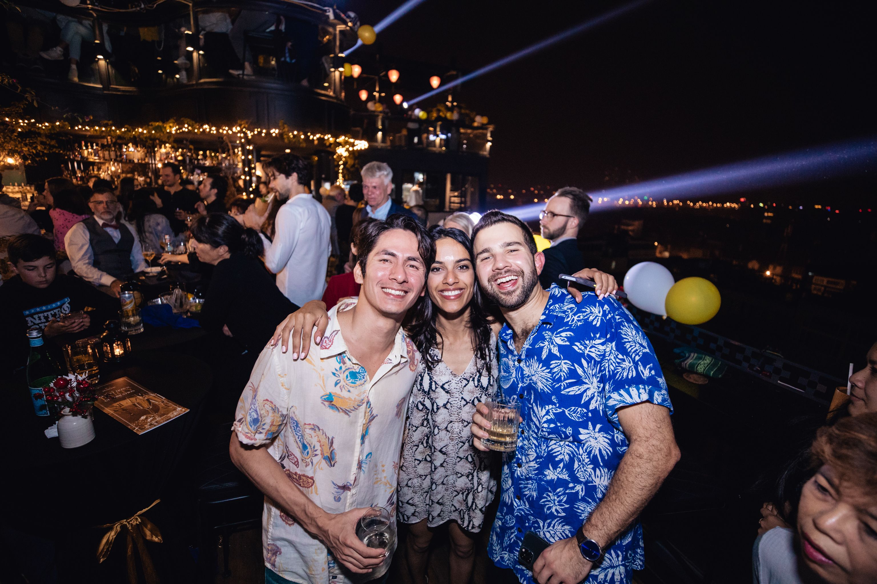 Night Party Celebration with Friends on Rooftop · Free Stock Photo