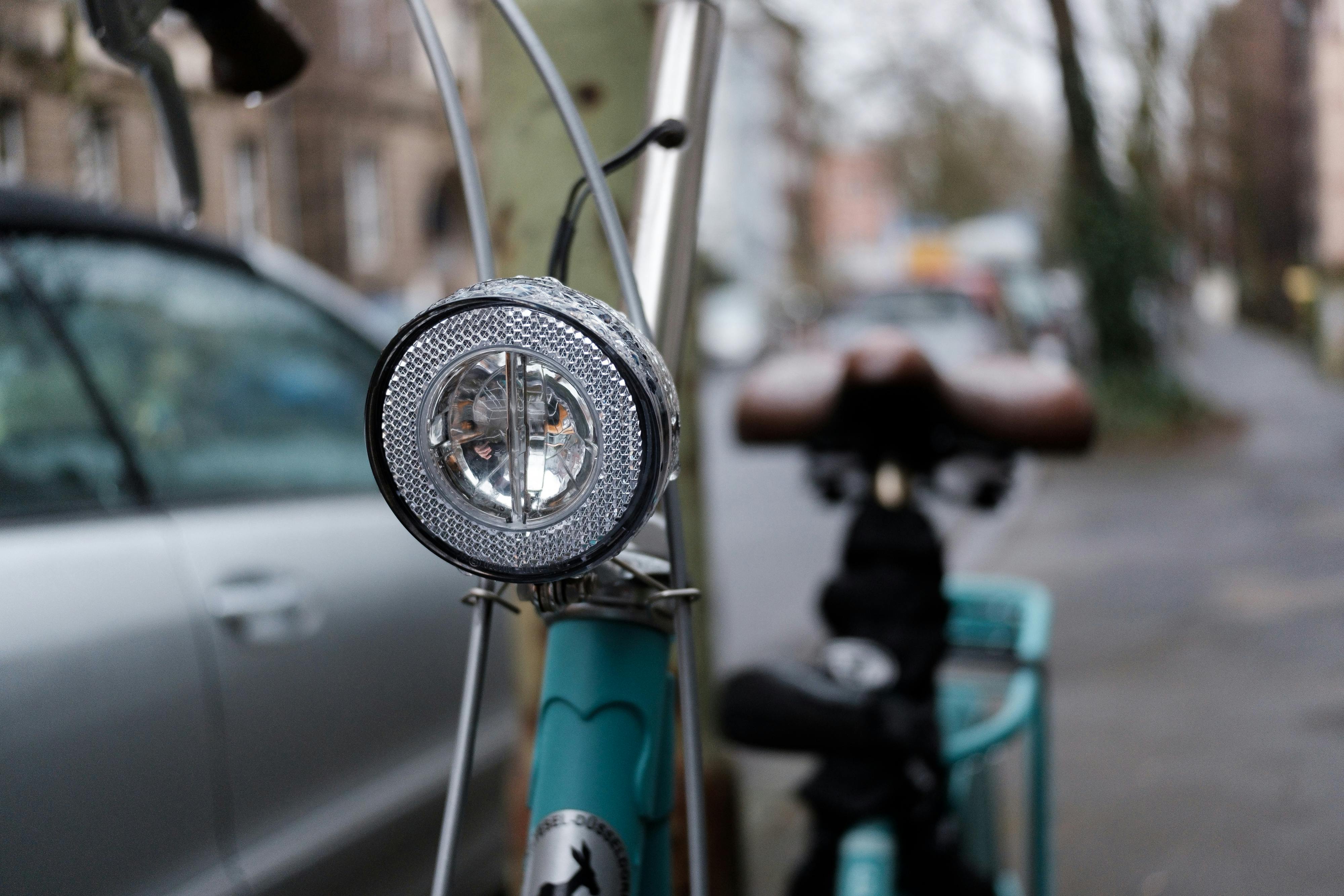 Vintage Bicycle Headlight in Urban Street · Free Stock Photo