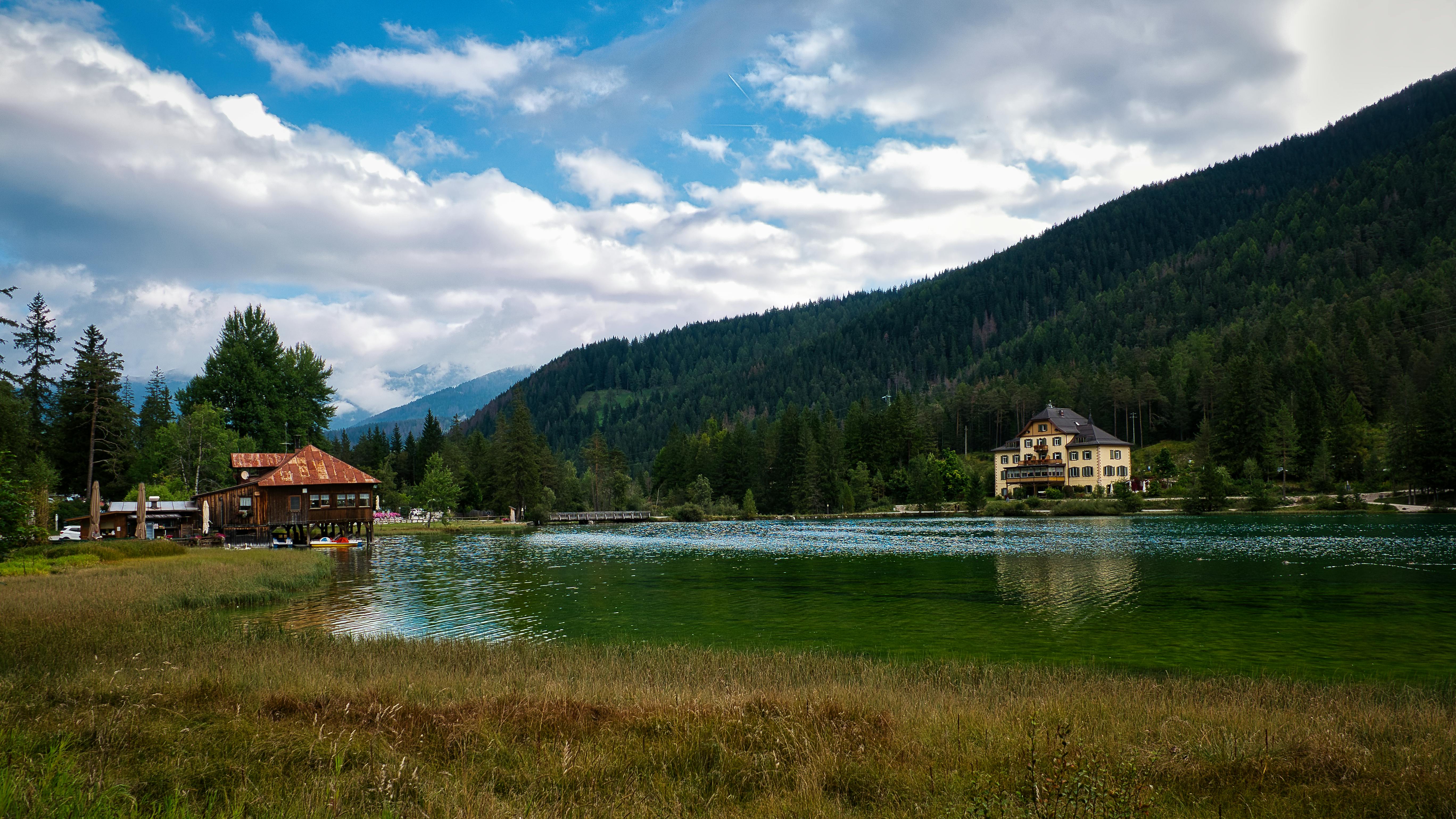 Scenic Alpine Lake in Toblach, Italy · Free Stock Photo