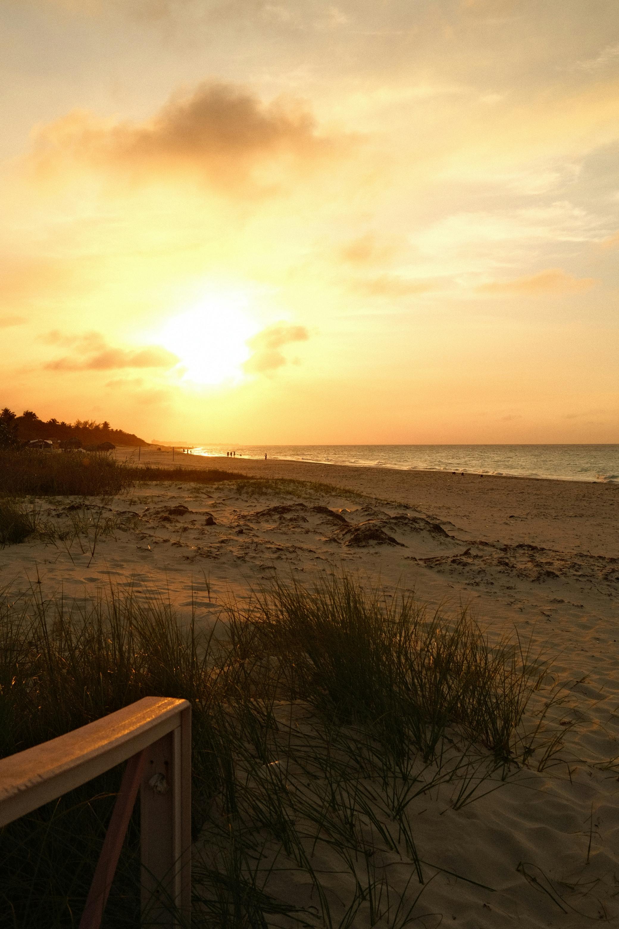 Stunning Cuban Beach Sunset with Golden Sky · Free Stock Photo