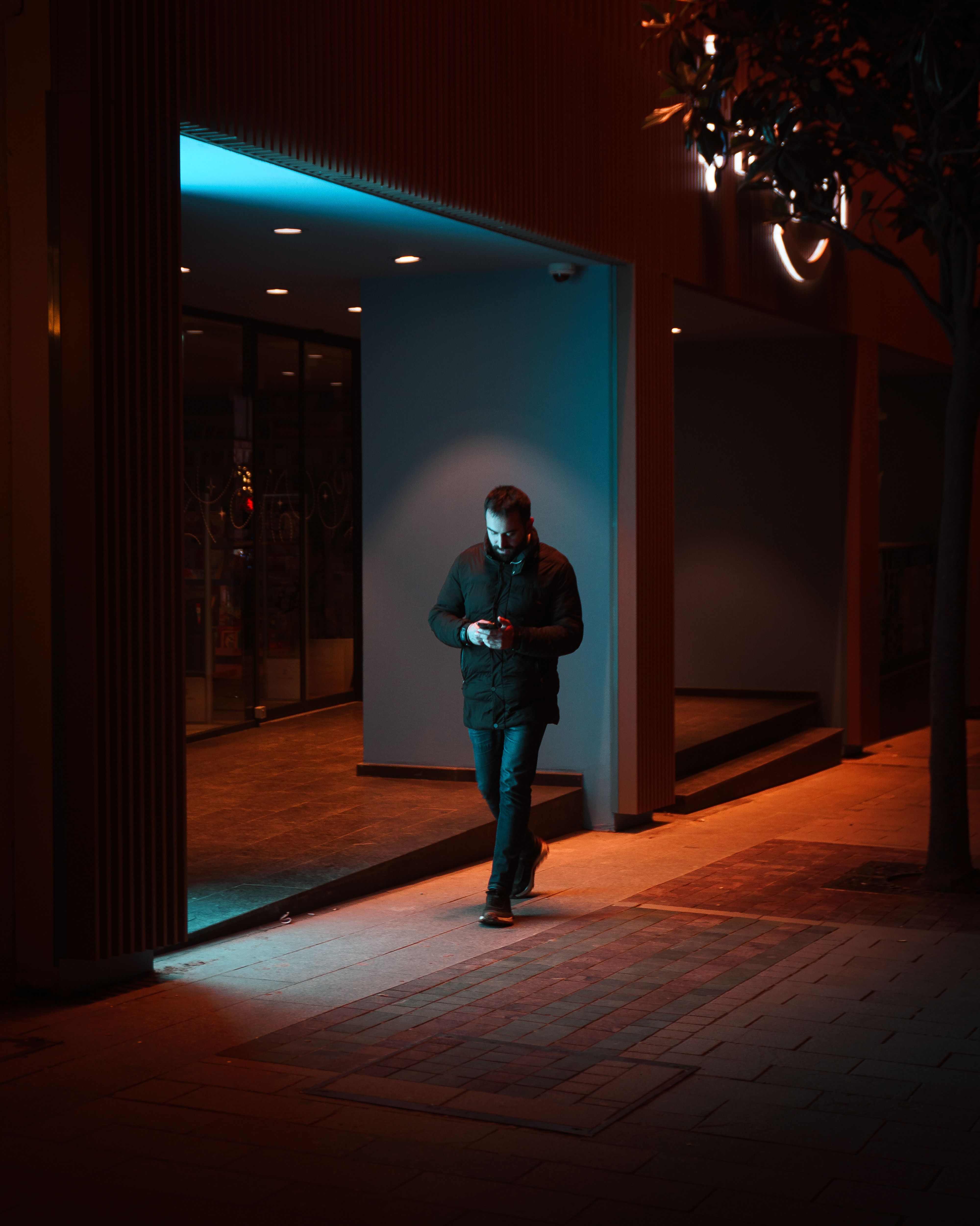 Man Walking at Night in Istanbul Under Neon Lights · Free Stock Photo
