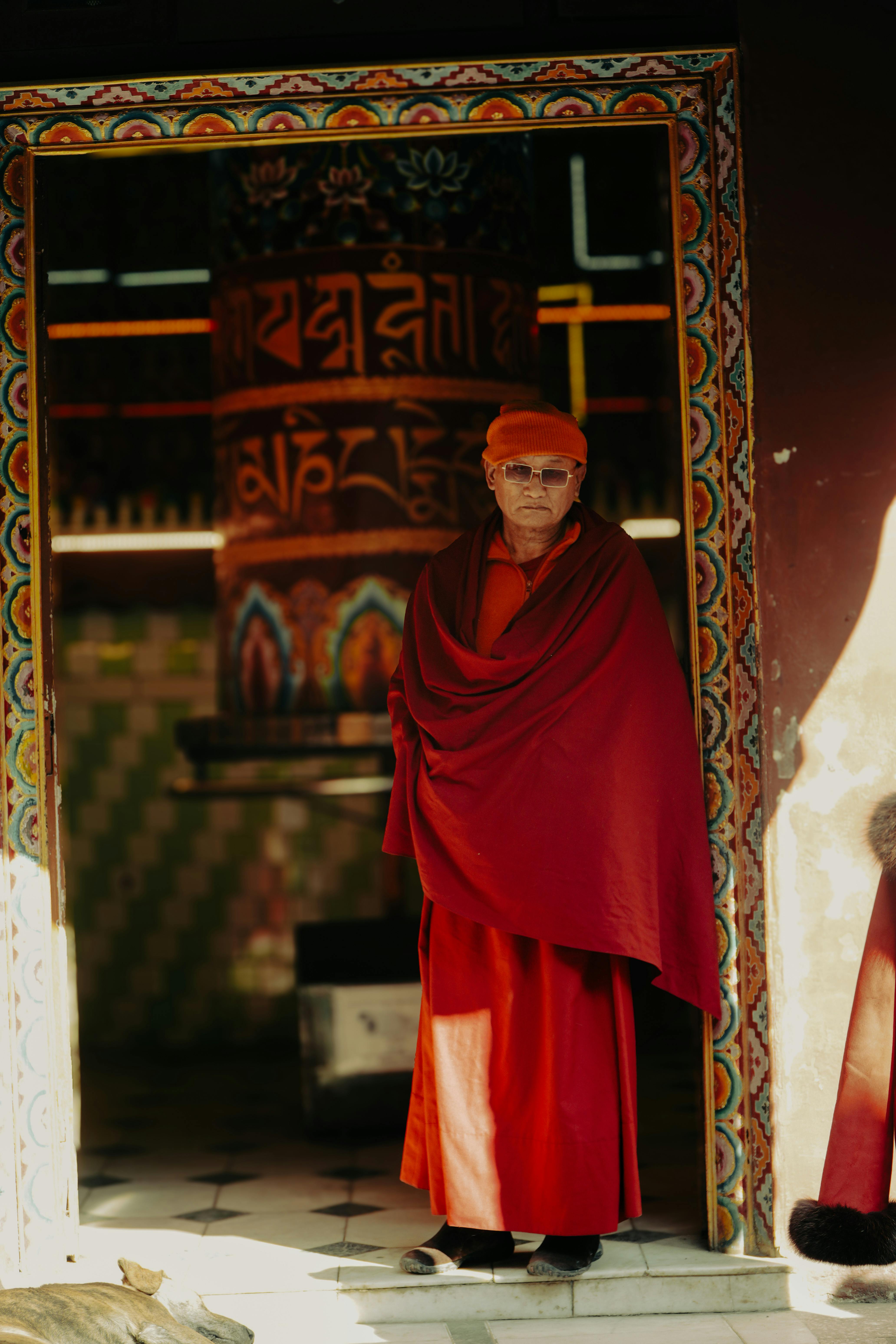Tibetan Monk in Traditional Attire at Monastery · Free Stock Photo