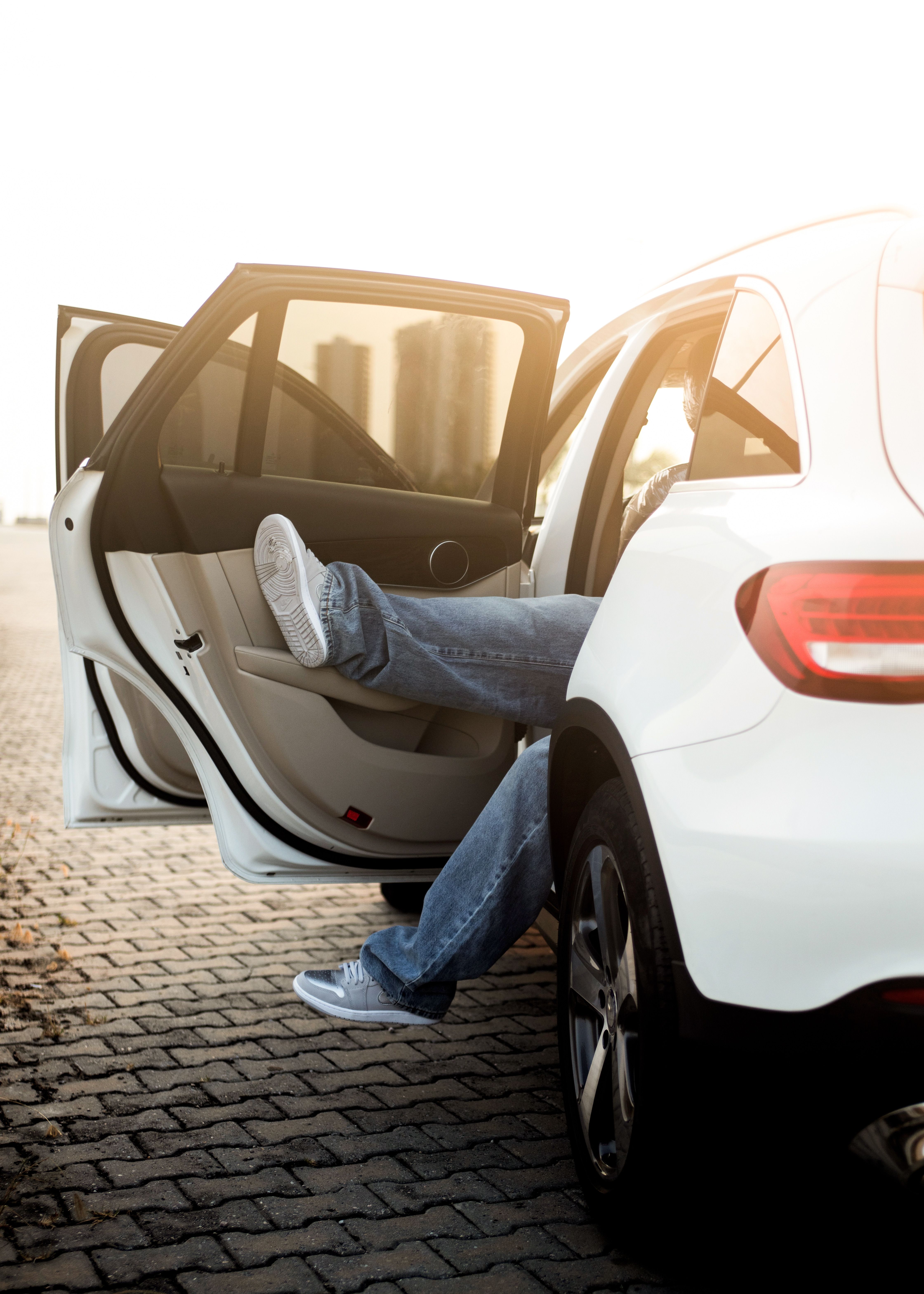 Relaxed Moment With Legs Out of Car · Free Stock Photo