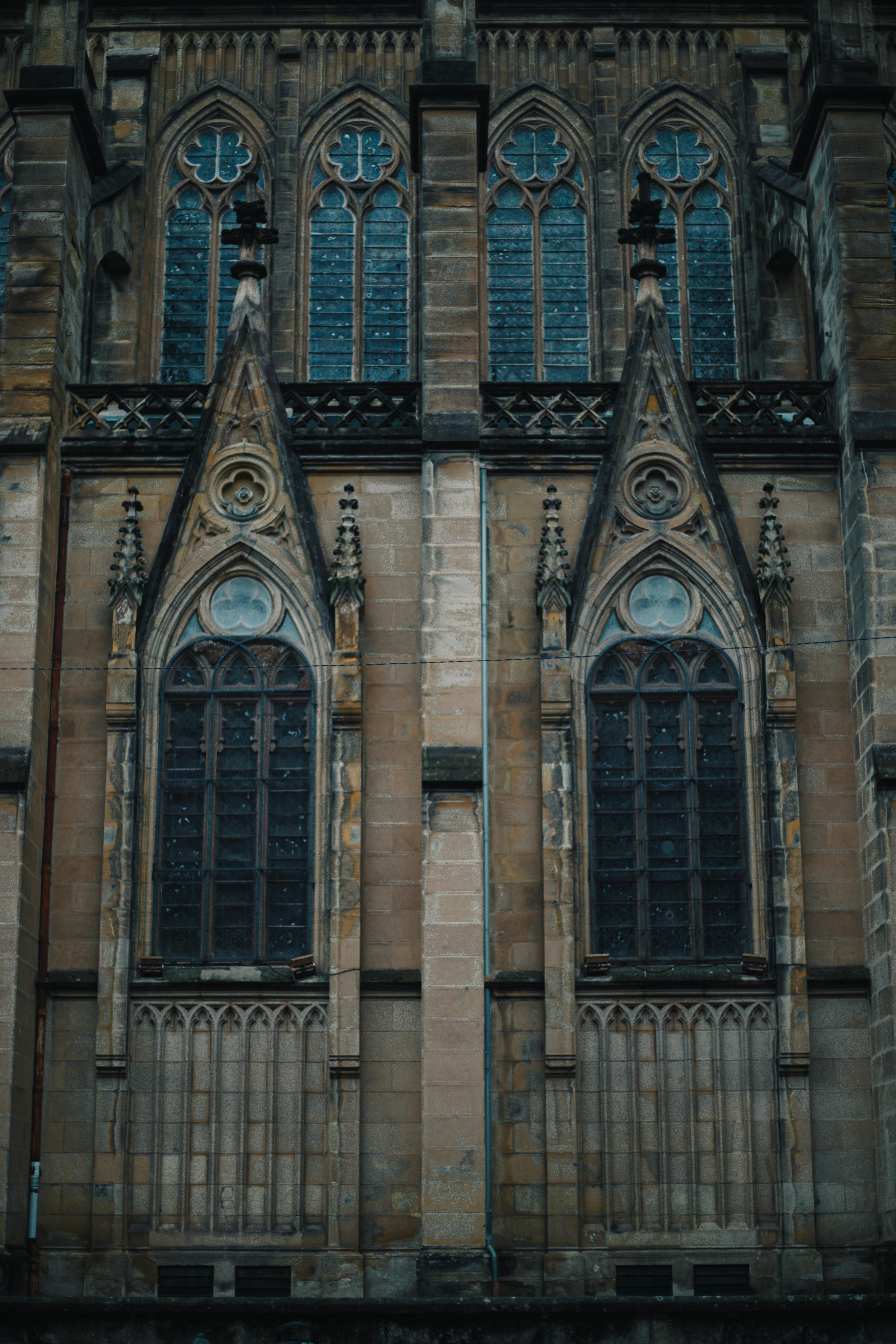 Gothic Cathedral Arched Windows Close-up · Free Stock Photo