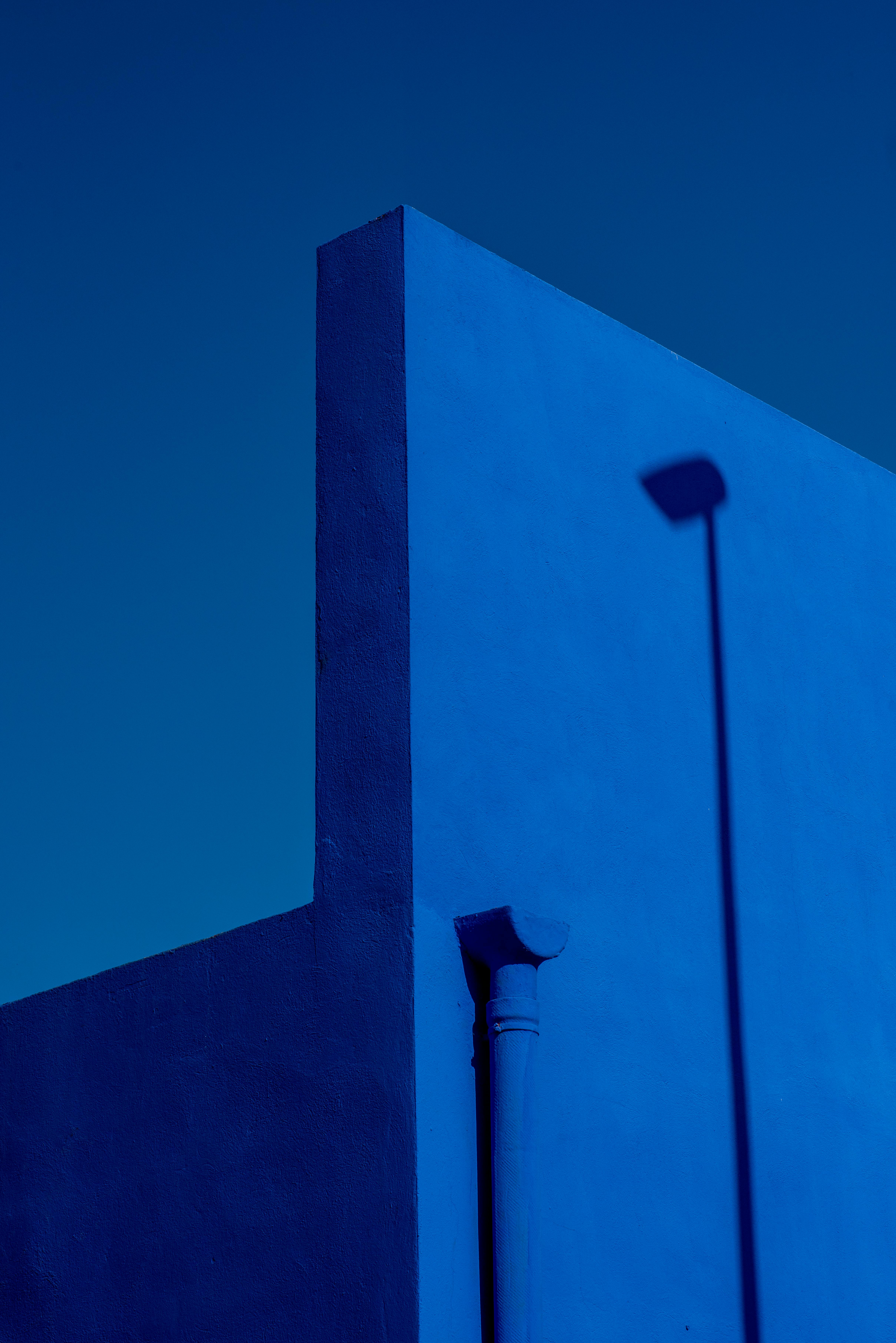 Abstract Blue Architectural Shadow Composition · Free Stock Photo