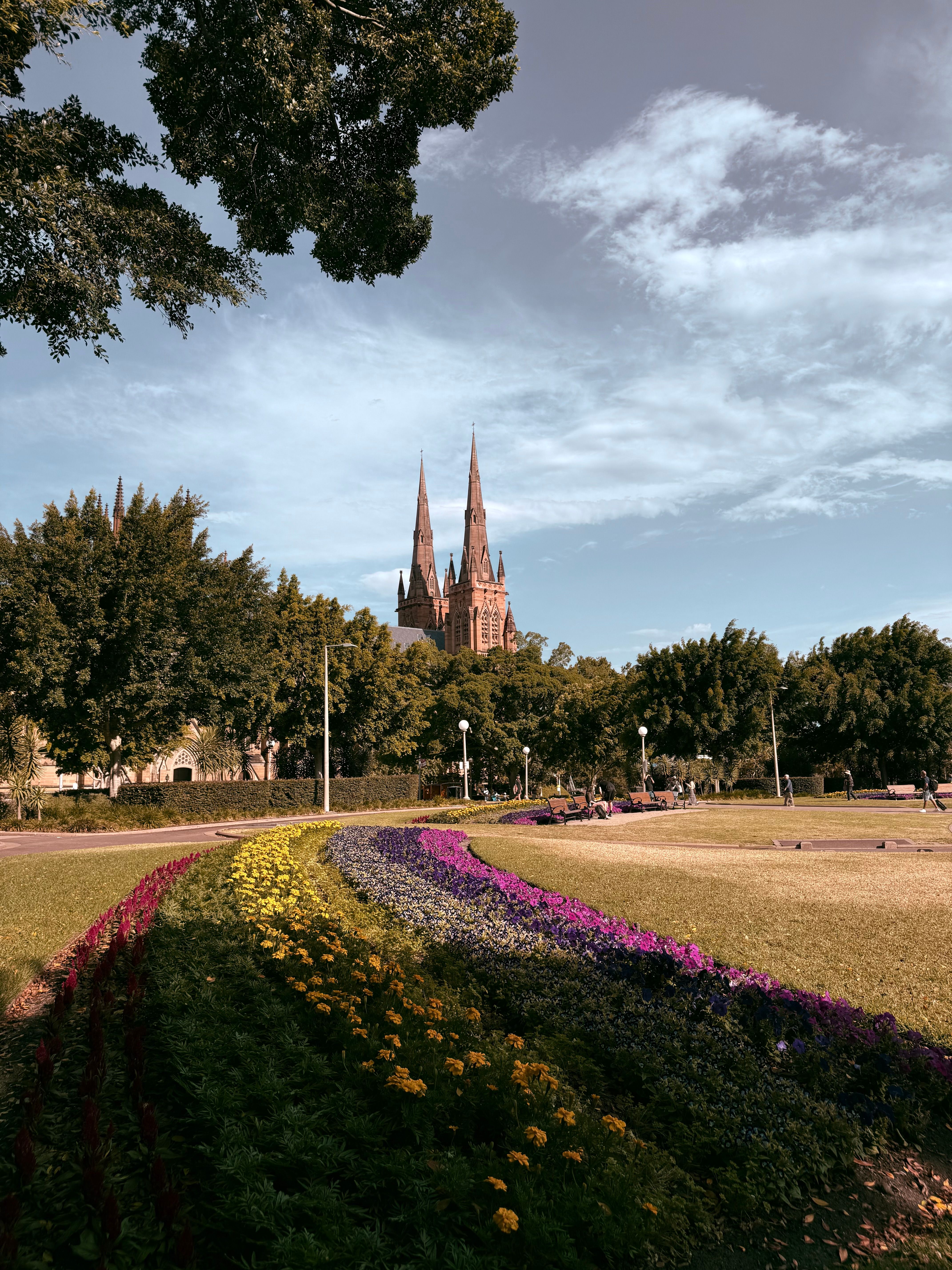 Beautiful Cathedral and Colorful Garden View · Free Stock Photo