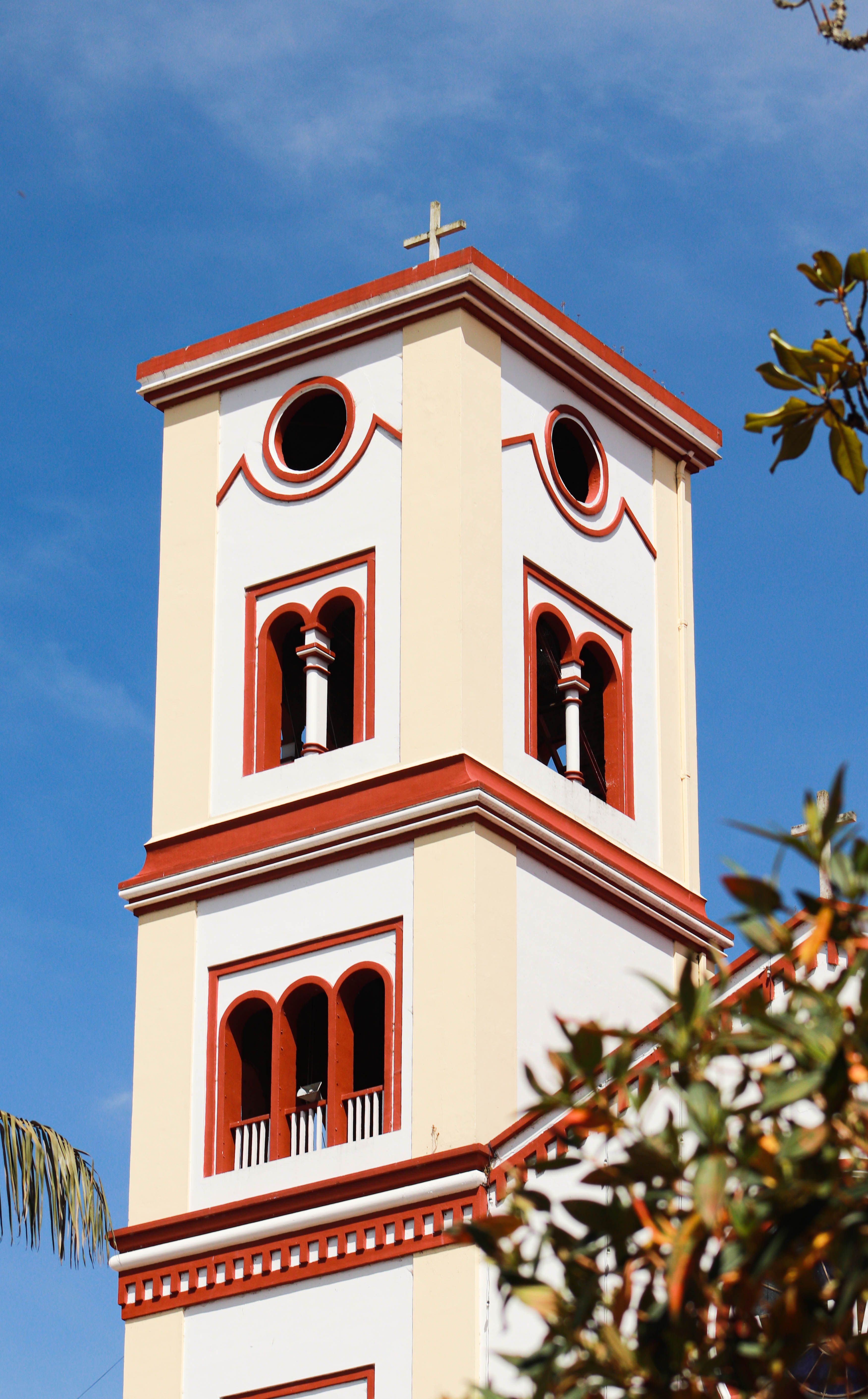 Colonial Church Tower Against Blue Sky · Free Stock Photo