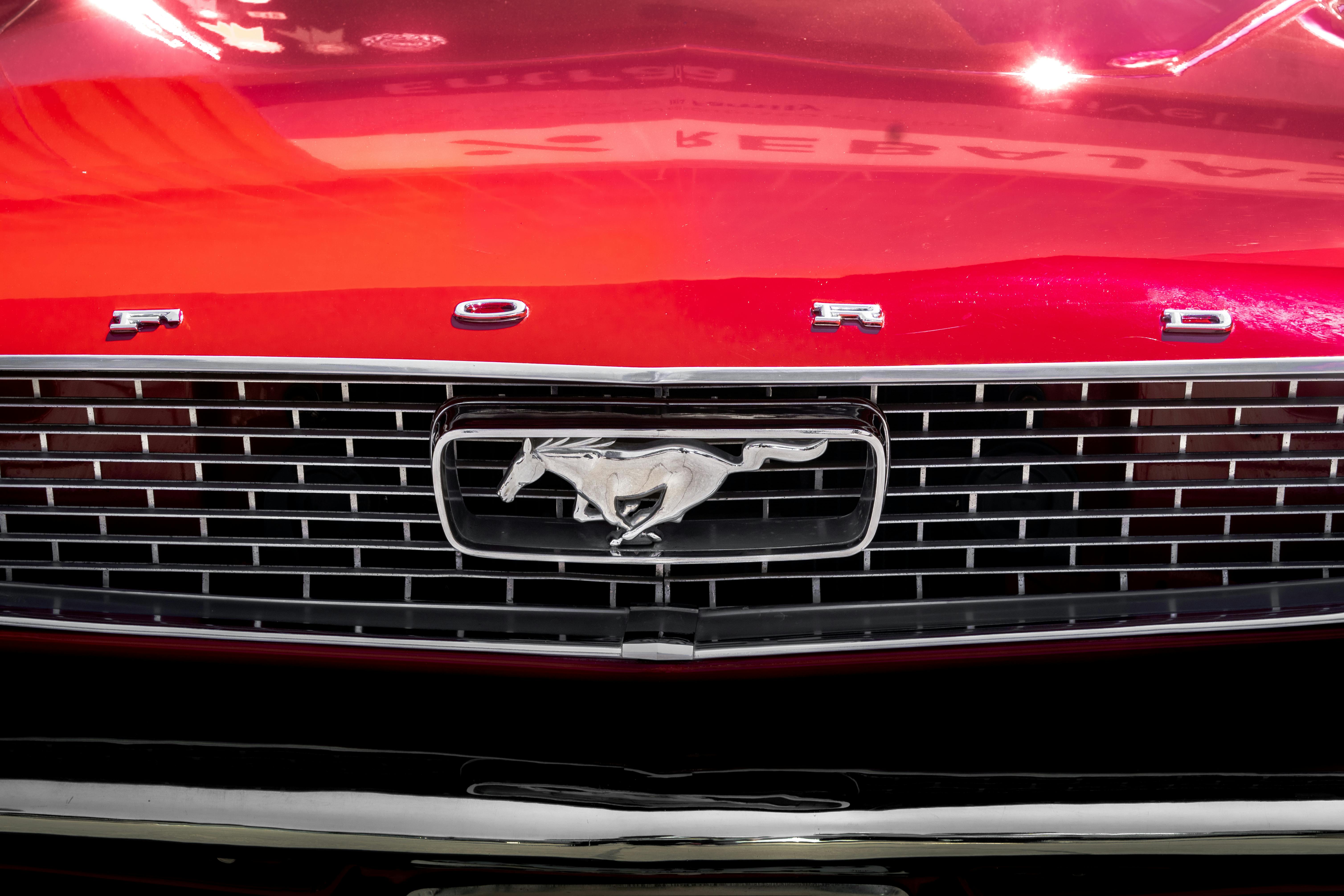 Close-up of a Classic Ford Mustang Grille · Free Stock Photo