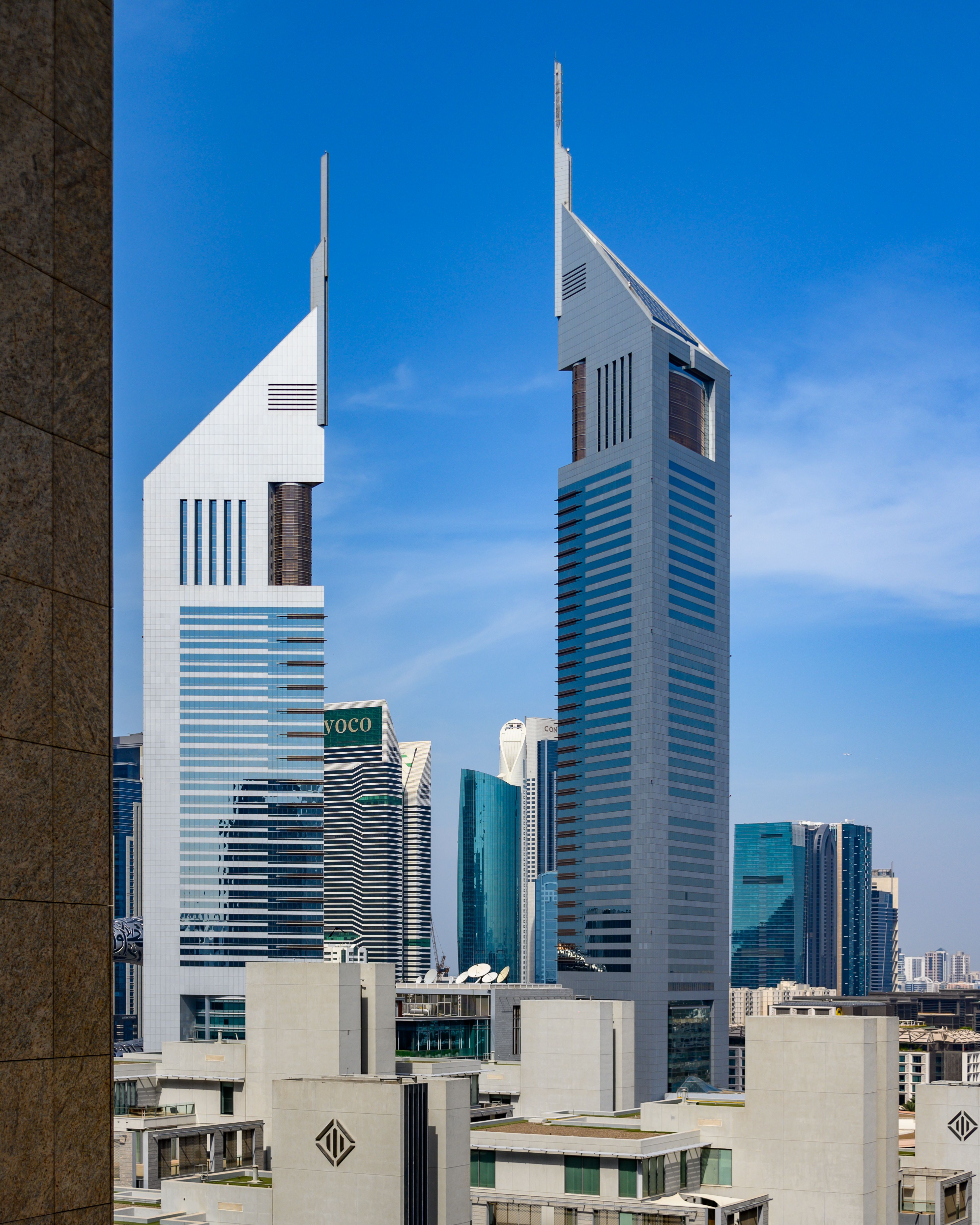 Iconic Emirates Towers in Dubai Skyline · Free Stock Photo
