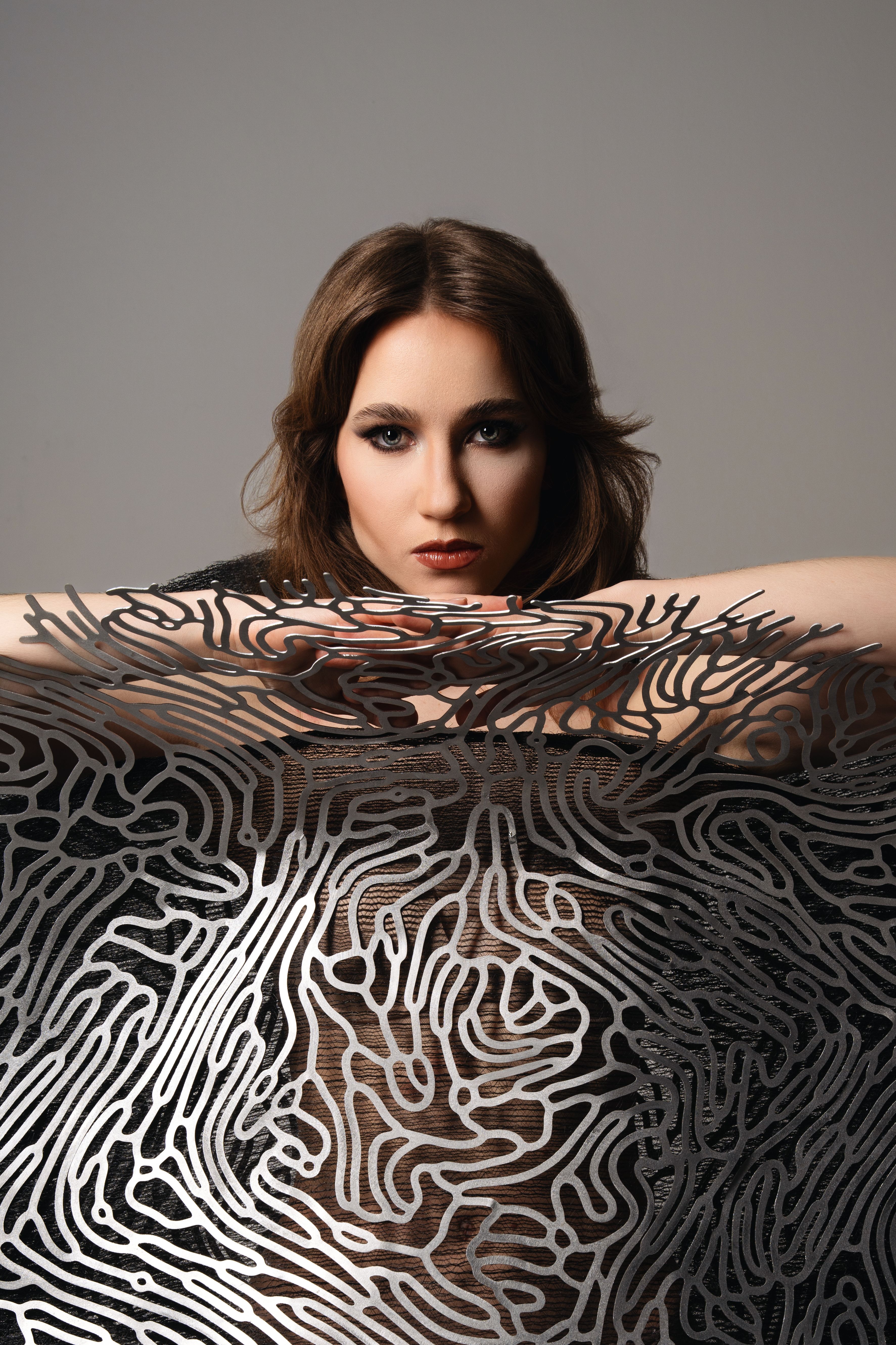 Fashion Model with Artistic Metal Torso Design · Free Stock Photo