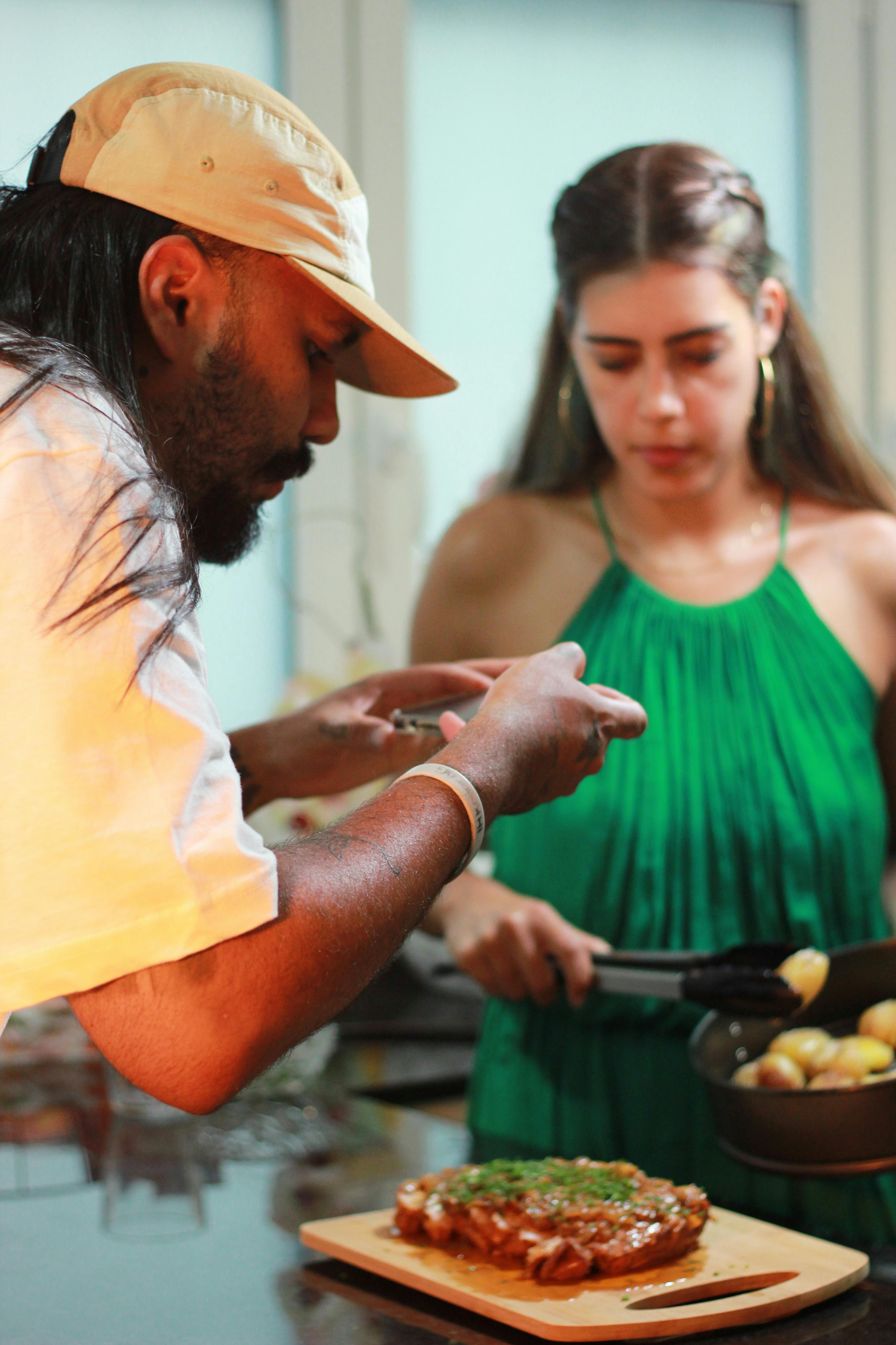 Culinary Scene with Two Chefs in Action · Free Stock Photo