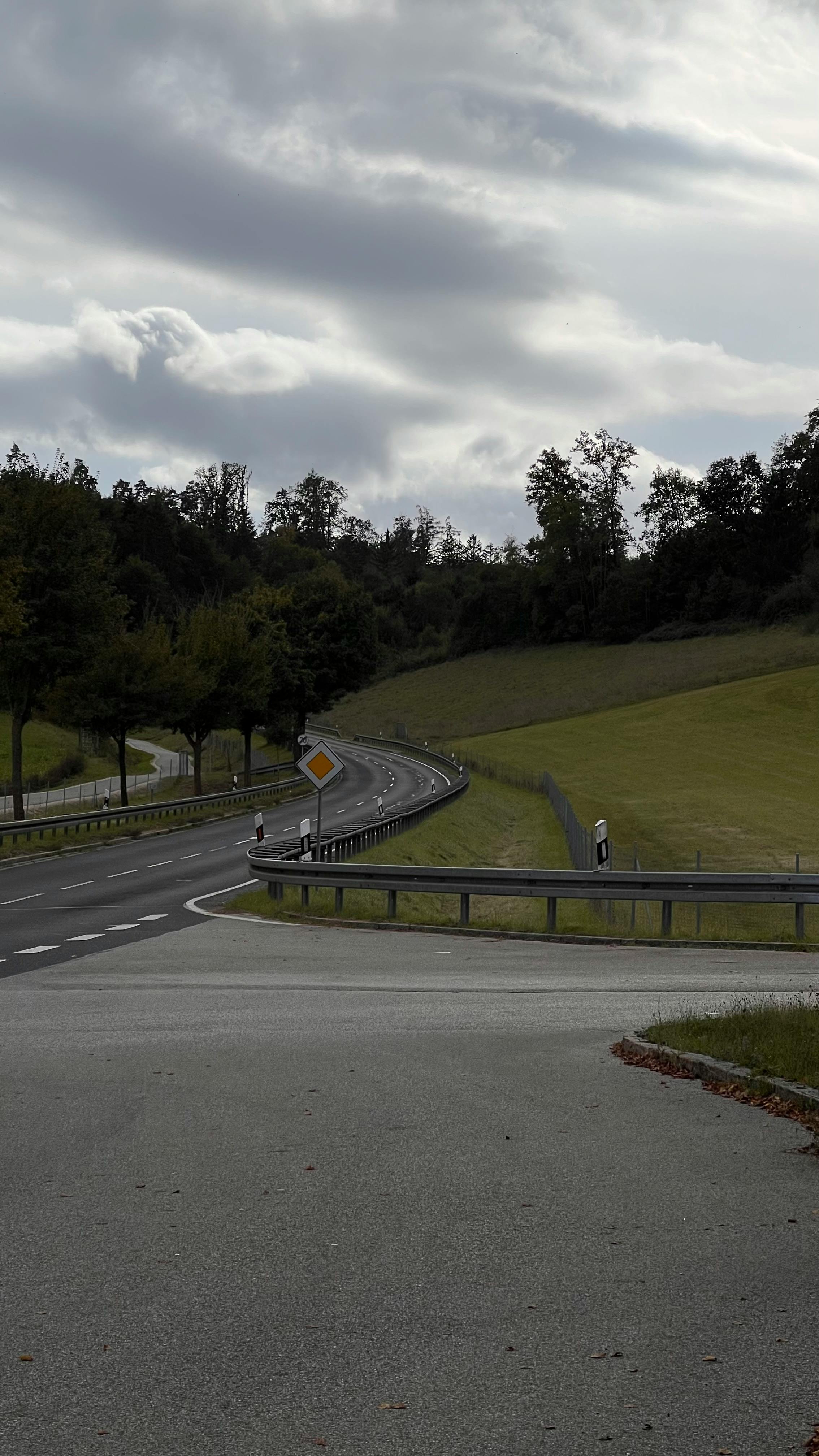 Curving Road Through Scenic Countryside · Free Stock Photo