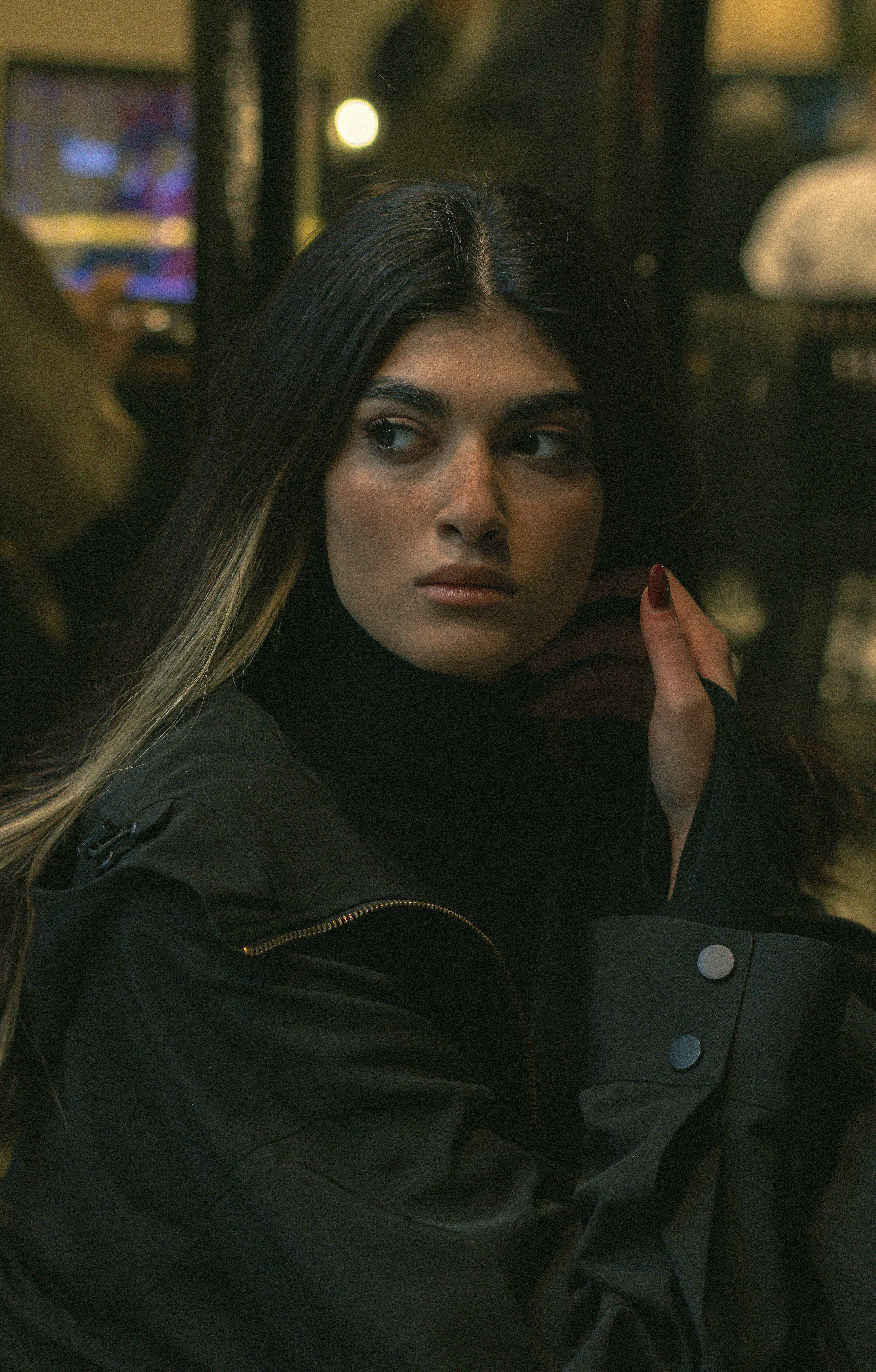 Moody Portrait of Woman Indoors in Low Light · Free Stock Photo