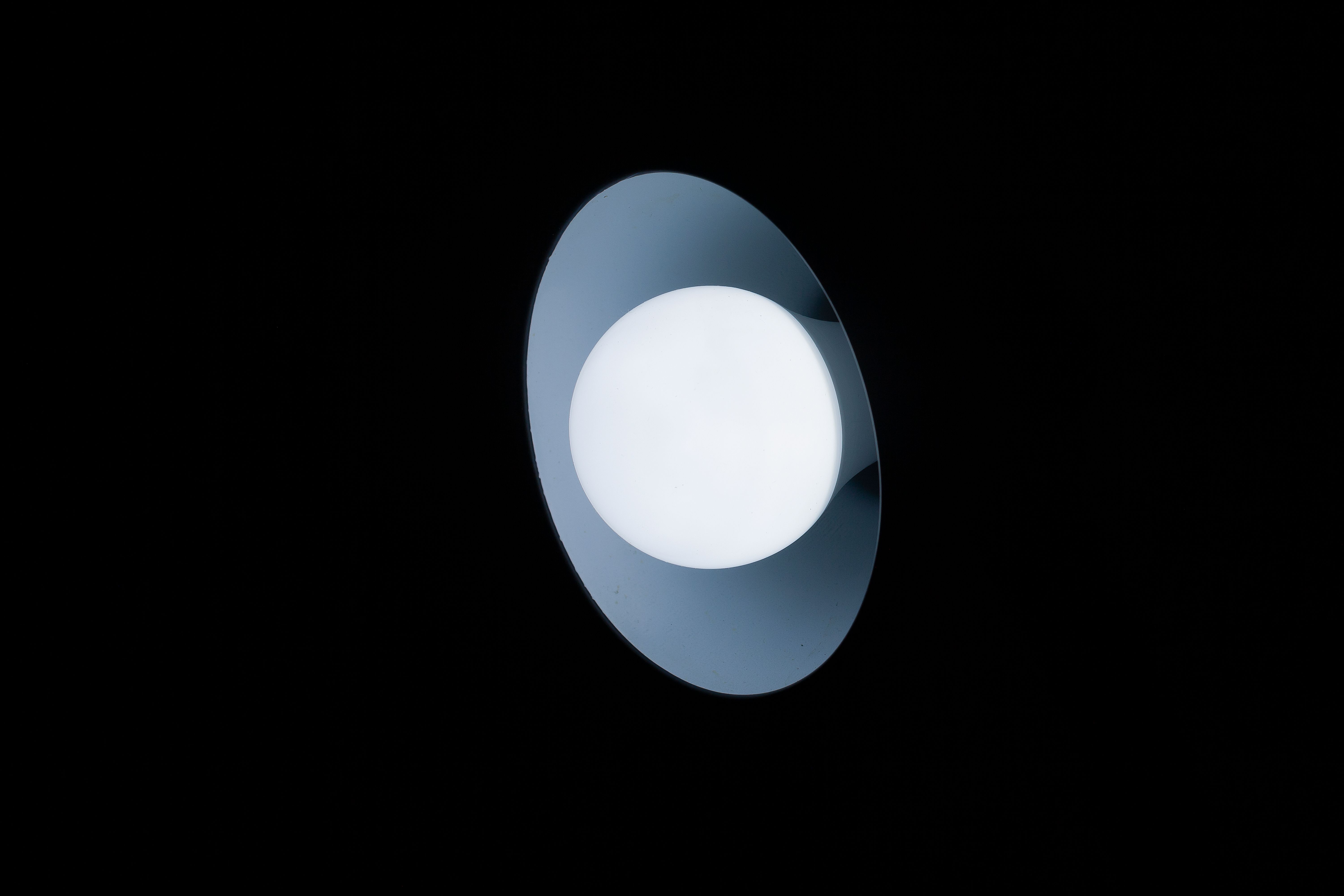 Minimalist Overhead Lighting Fixture in Darkness · Free Stock Photo