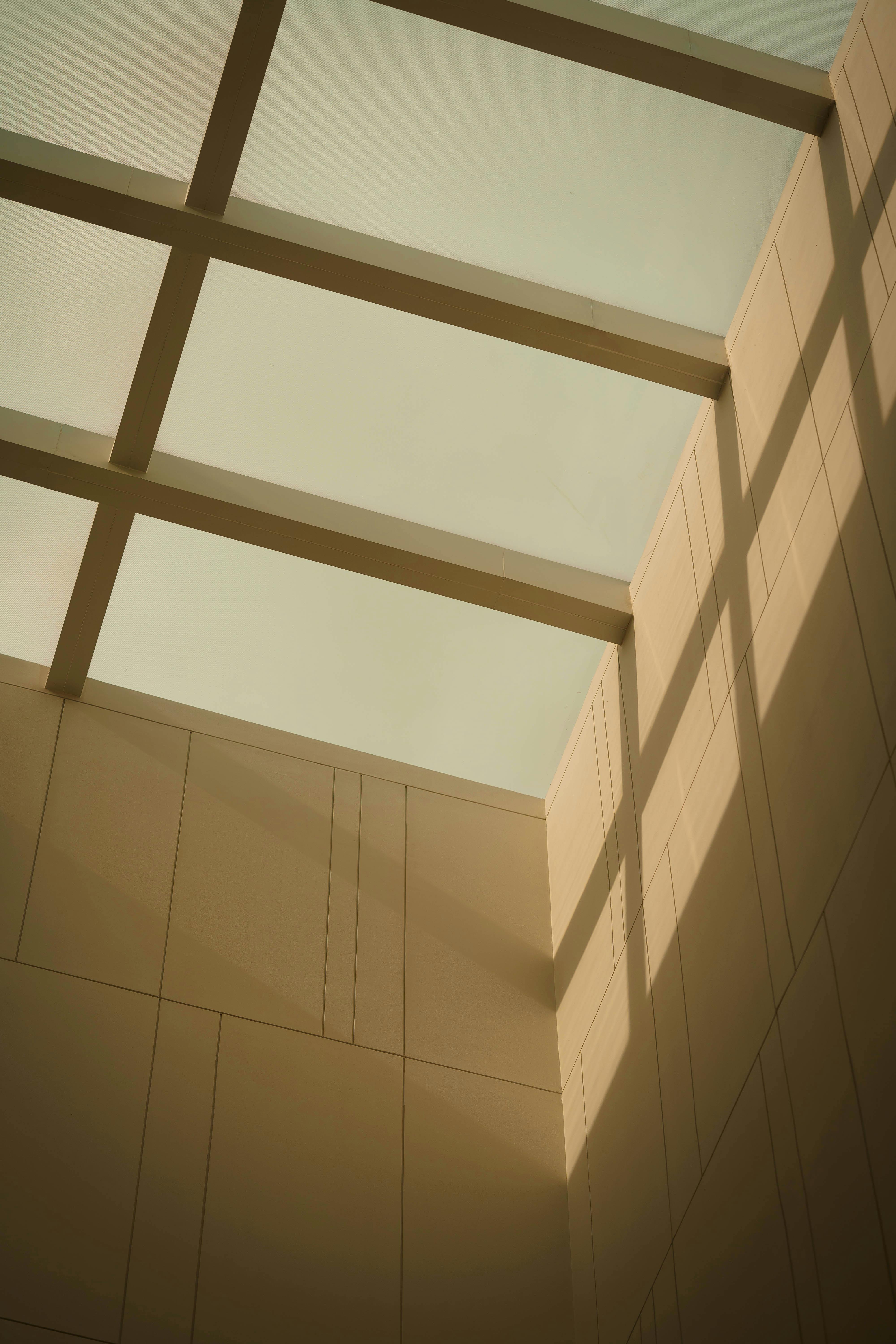 Minimalist Architecture with Geometric Shadows · Free Stock Photo