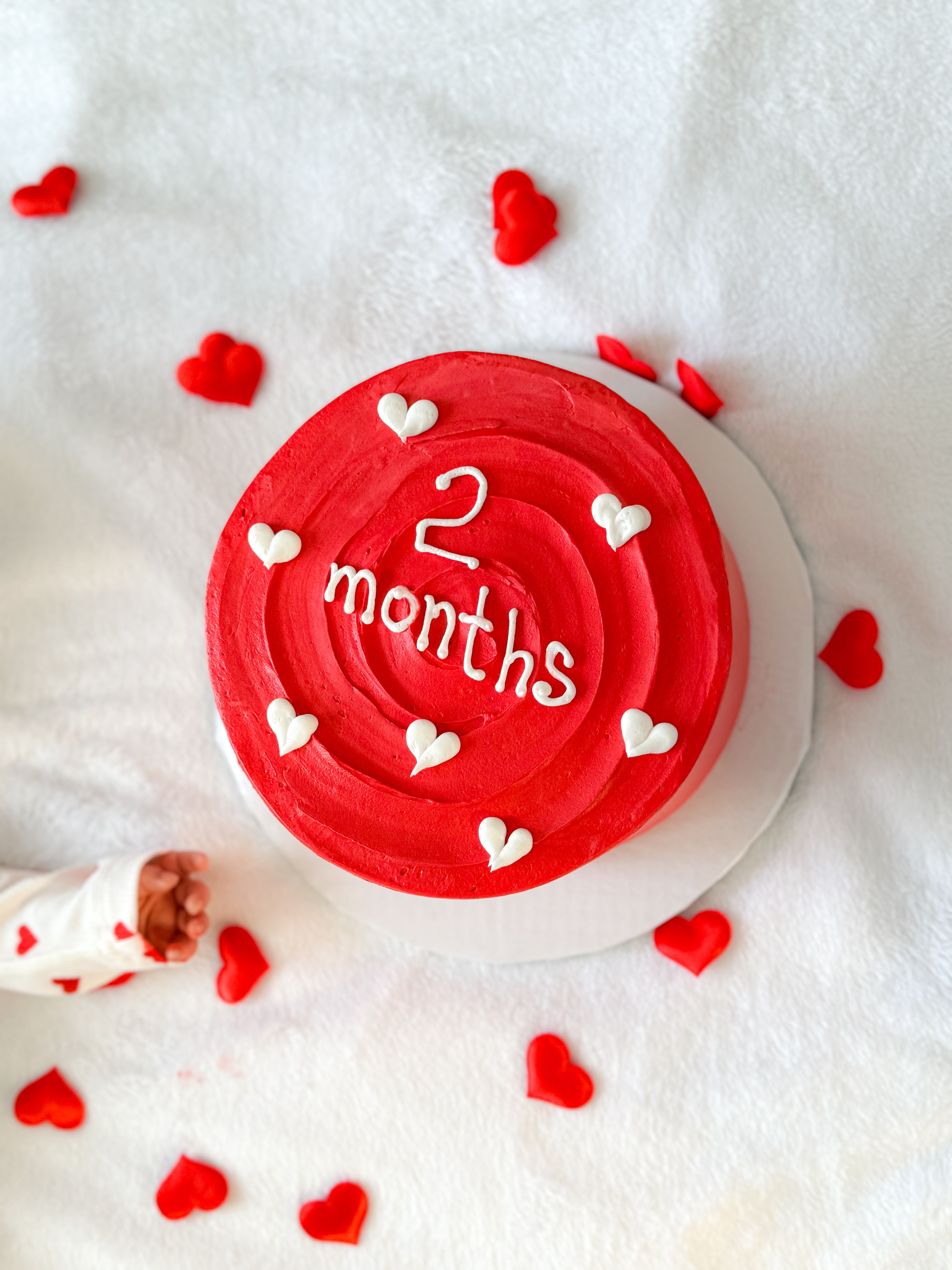 Colorful 2 Months Celebration Cake with Hearts · Free Stock Photo