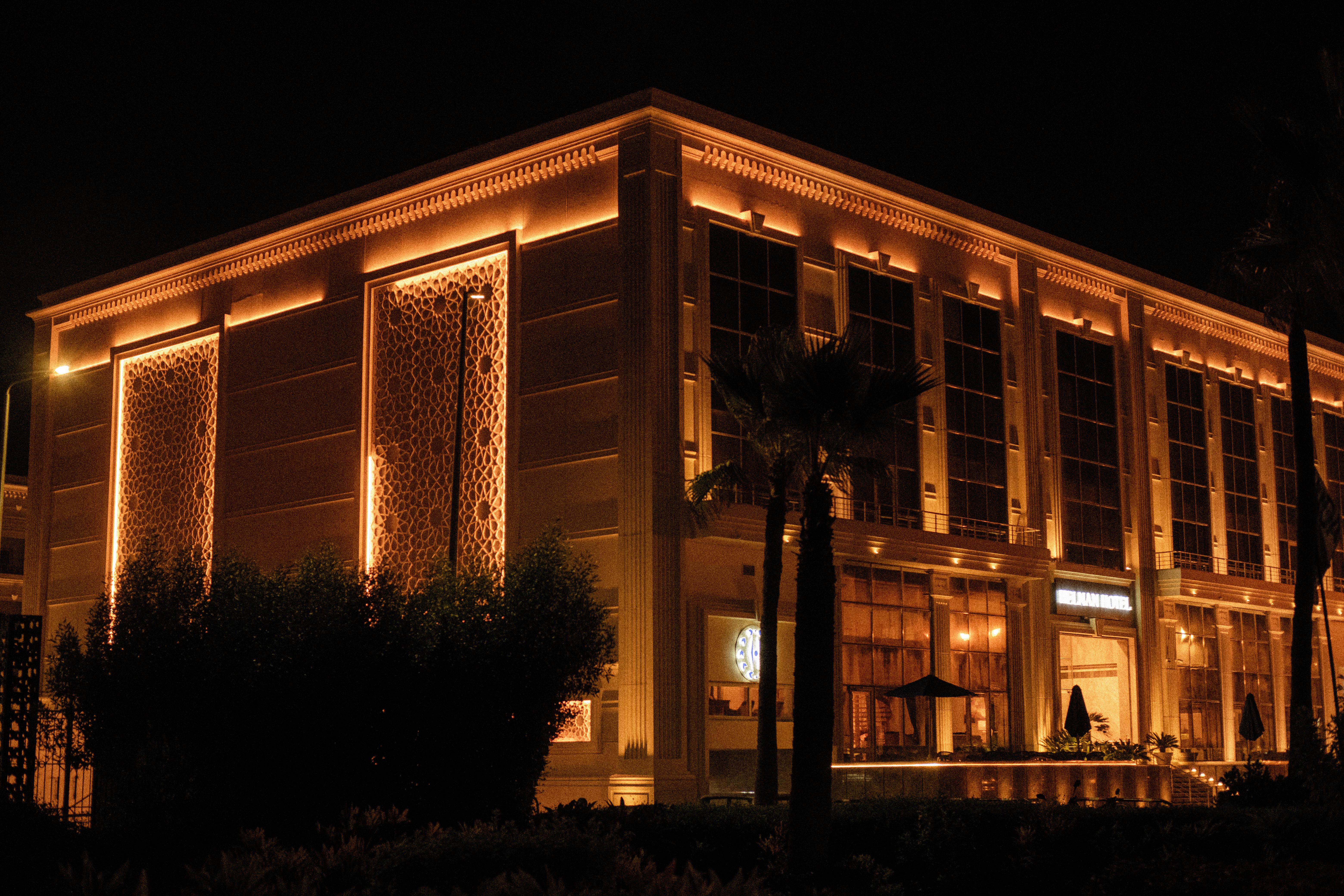 Elegant Building Facade Illuminated at Night · Free Stock Photo