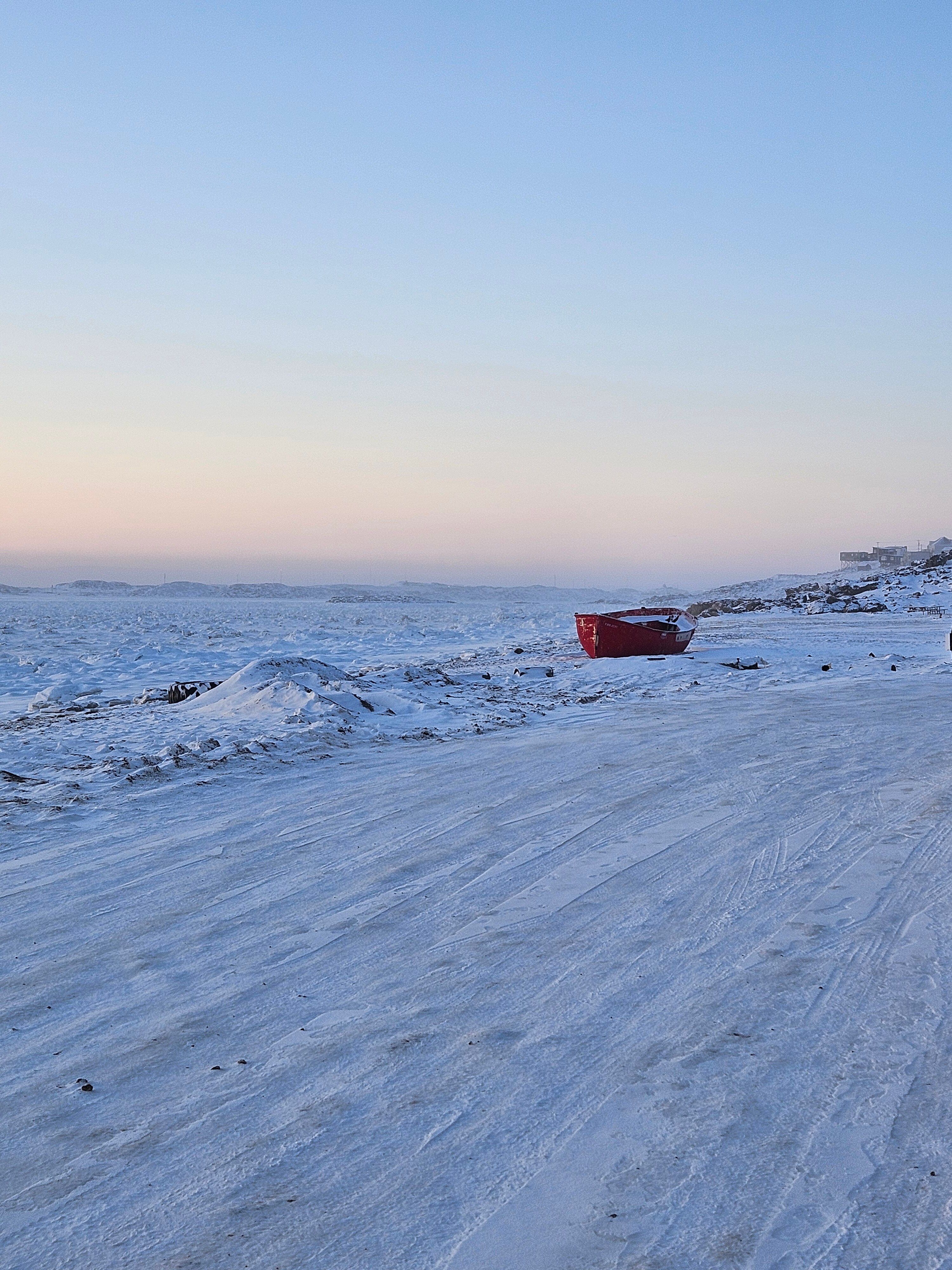 Snowy Arctic Landscape with Red Boat · Free Stock Photo