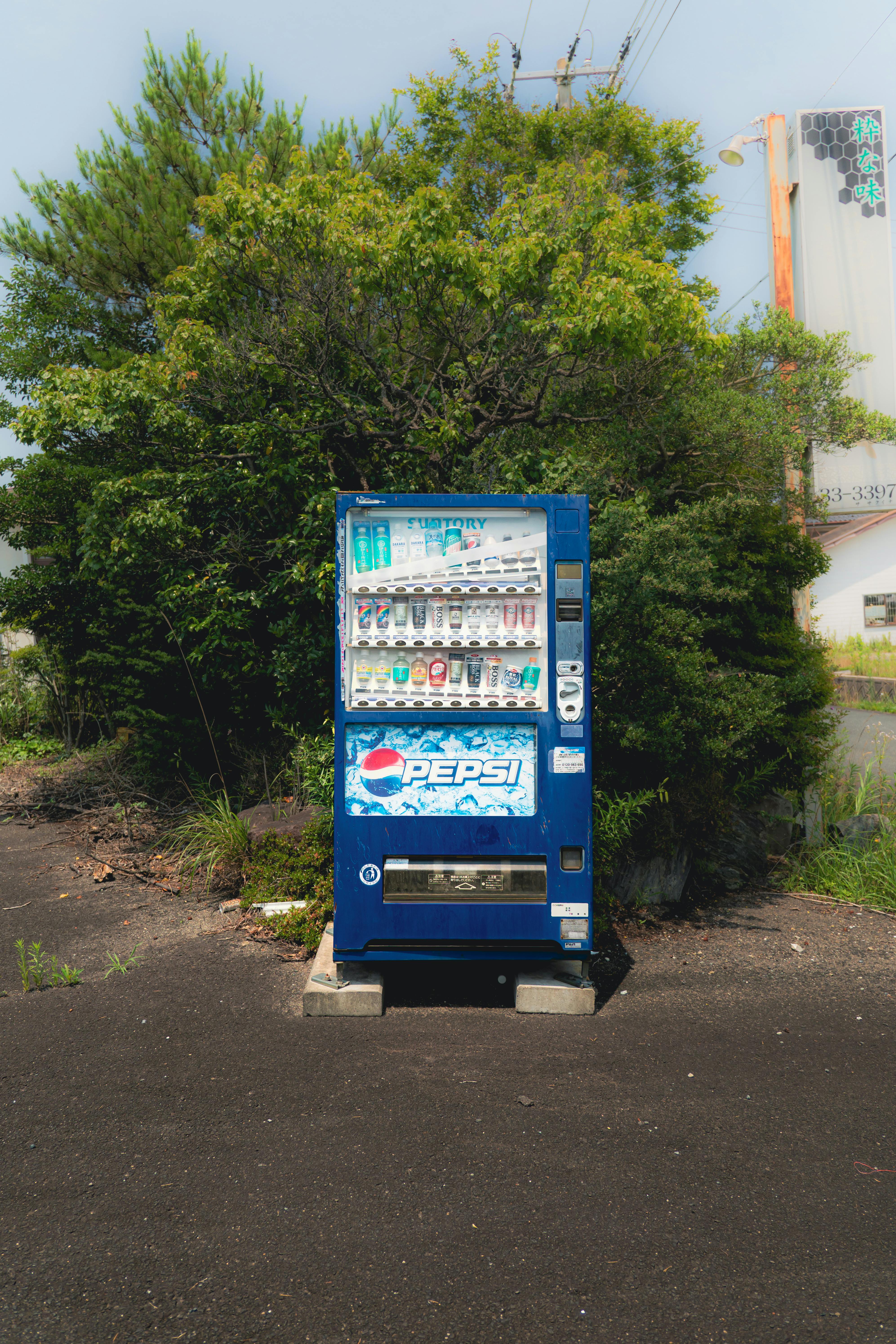 Outdoor Pepsi Vending Machine in Urban Setting · Free Stock Photo