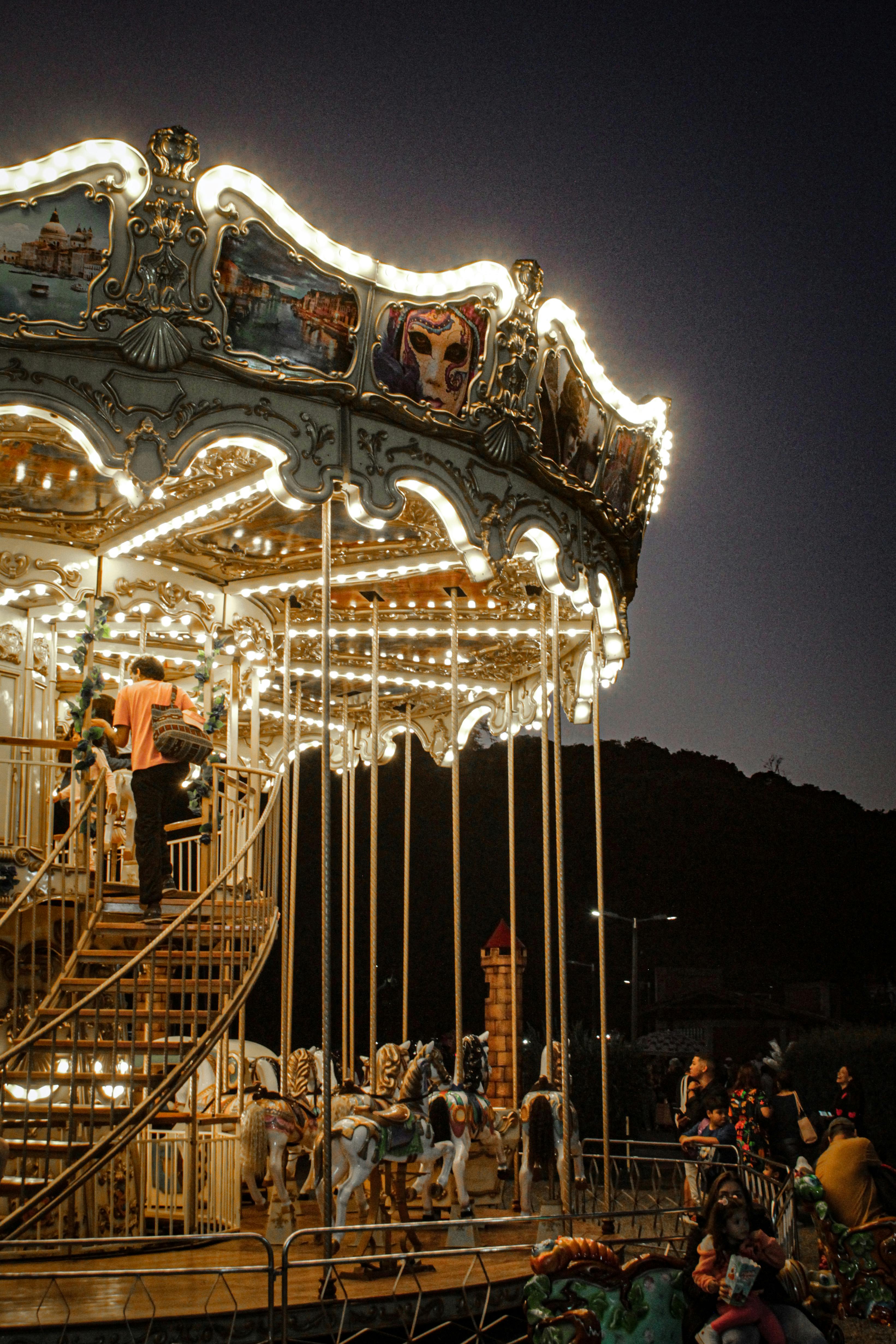 Enchanting Twilight Carousel Ride Experience · Free Stock Photo