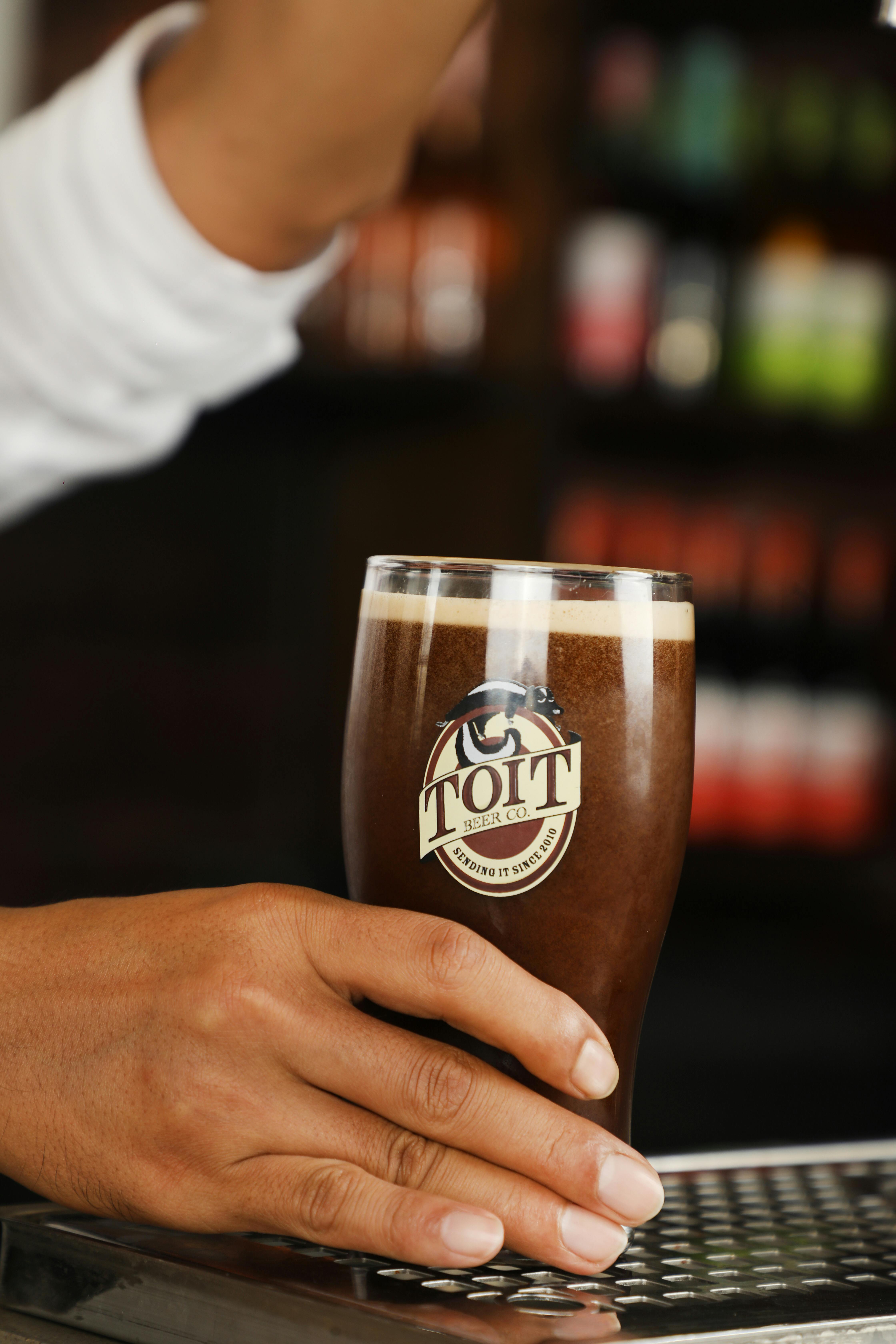 Craft Beer Being Served at Toit Brewery · Free Stock Photo