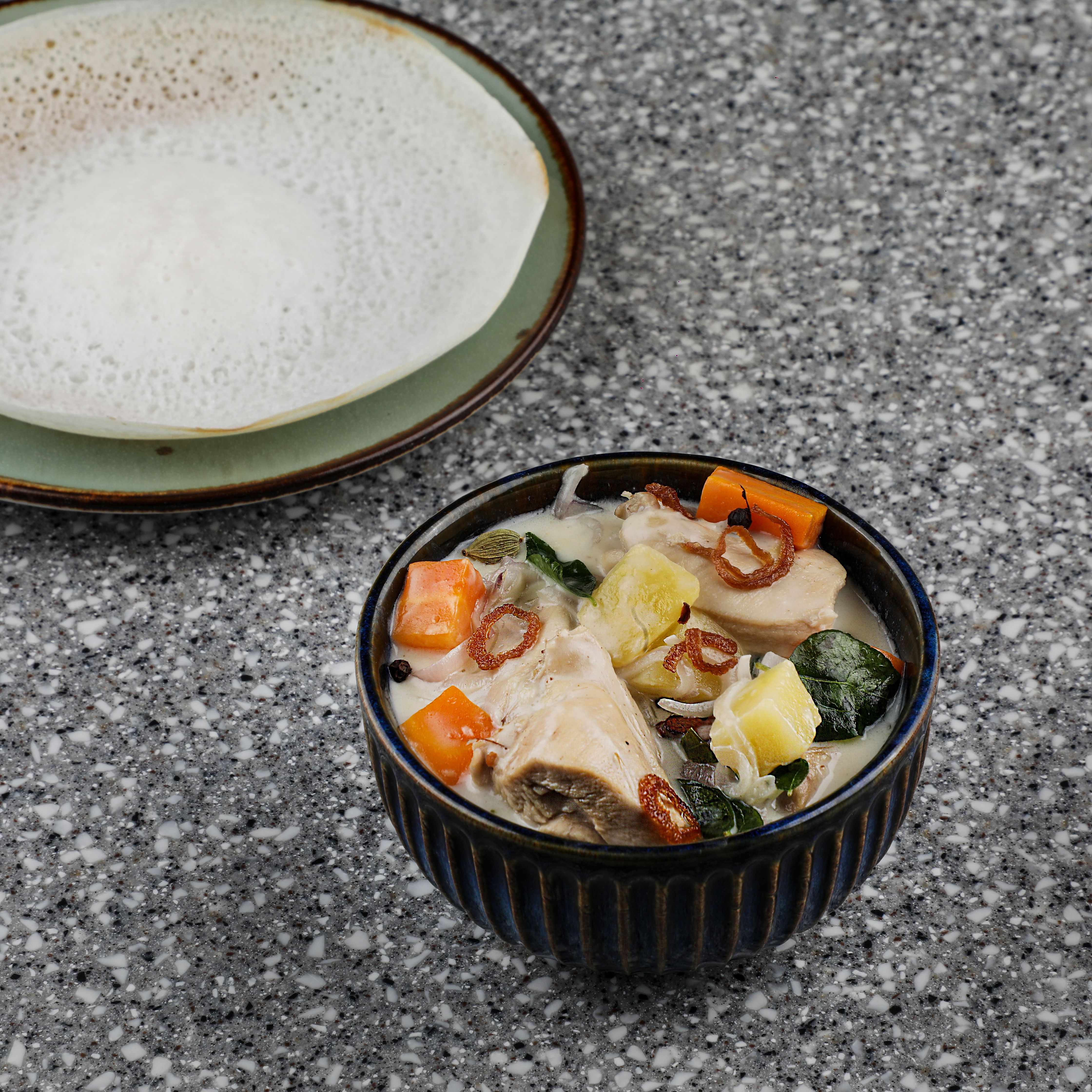 Delicious Kerala Style Appam with Stew on Granite Table · Free Stock Photo