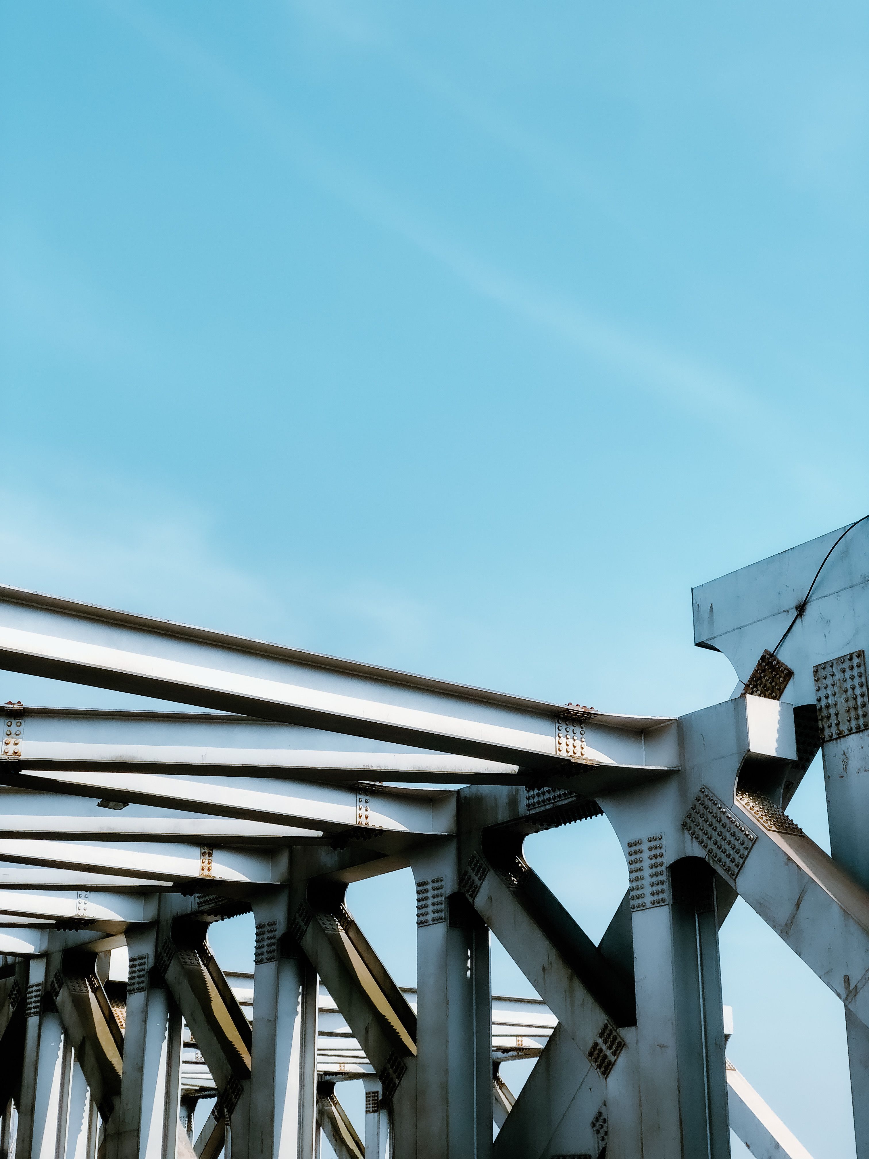 Steel Bridge Architecture Against Clear Blue Sky · Free Stock Photo