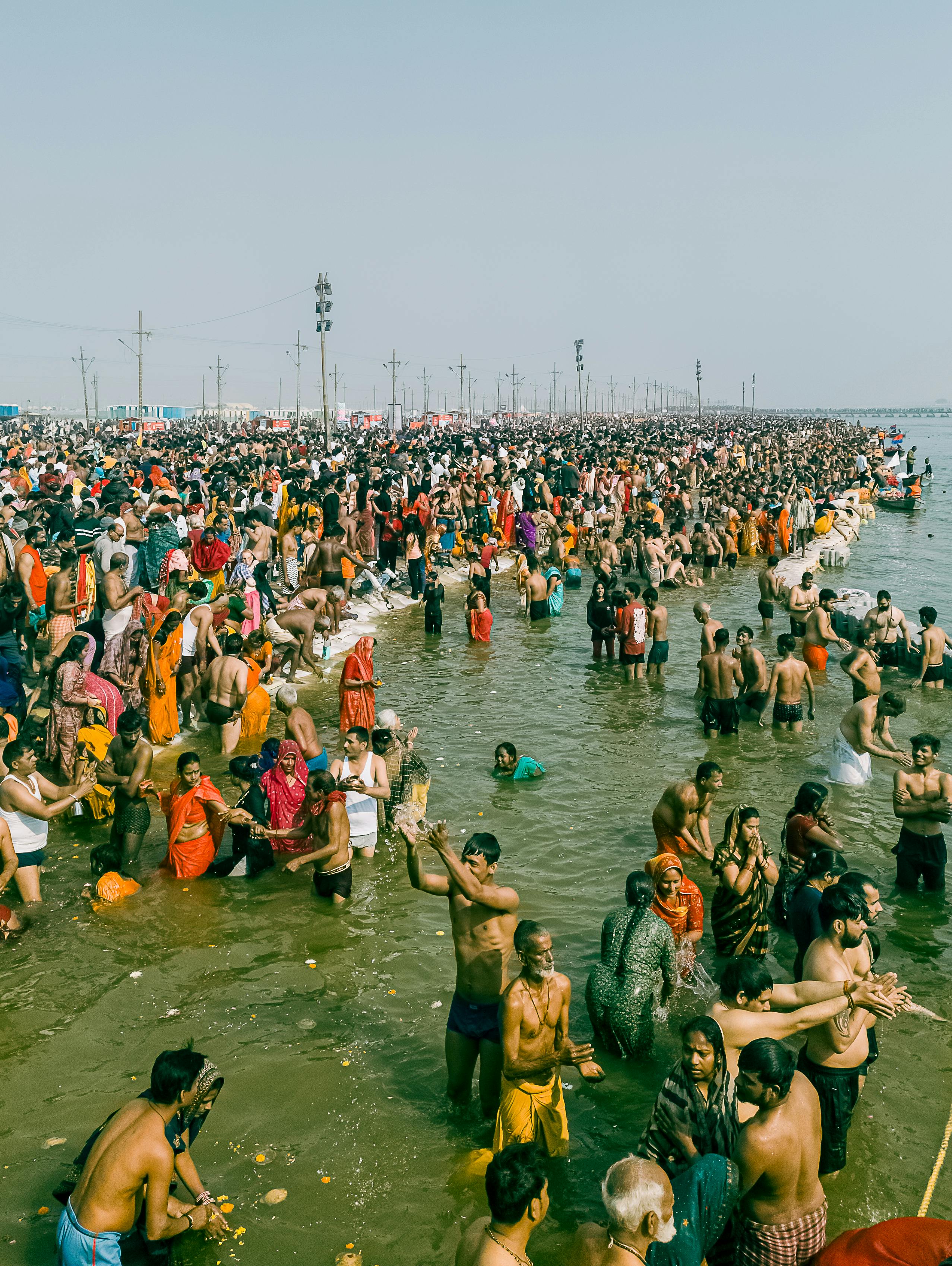 Crowds Gather in Prayagraj for Ritual Bathing · Free Stock Photo