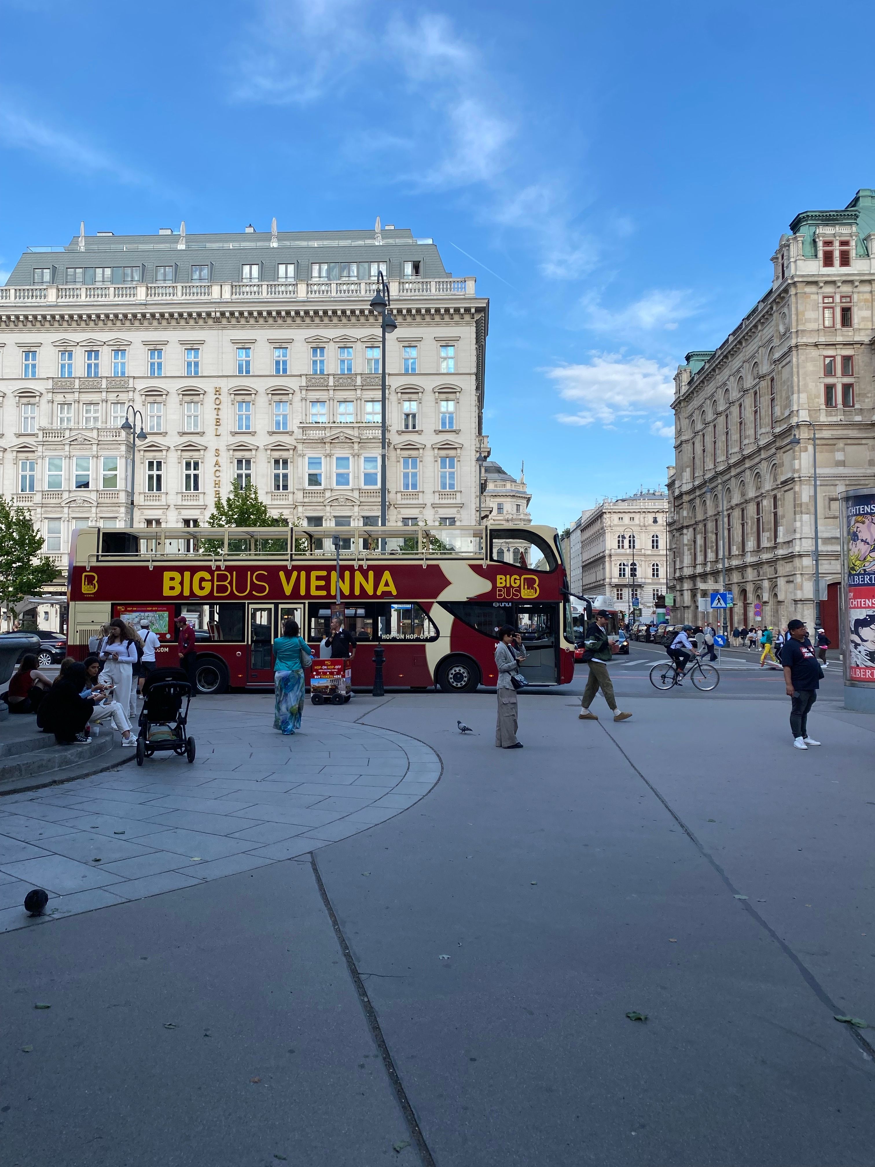 Vienna City Street with Tour Bus and Historic Buildings · Free Stock Photo