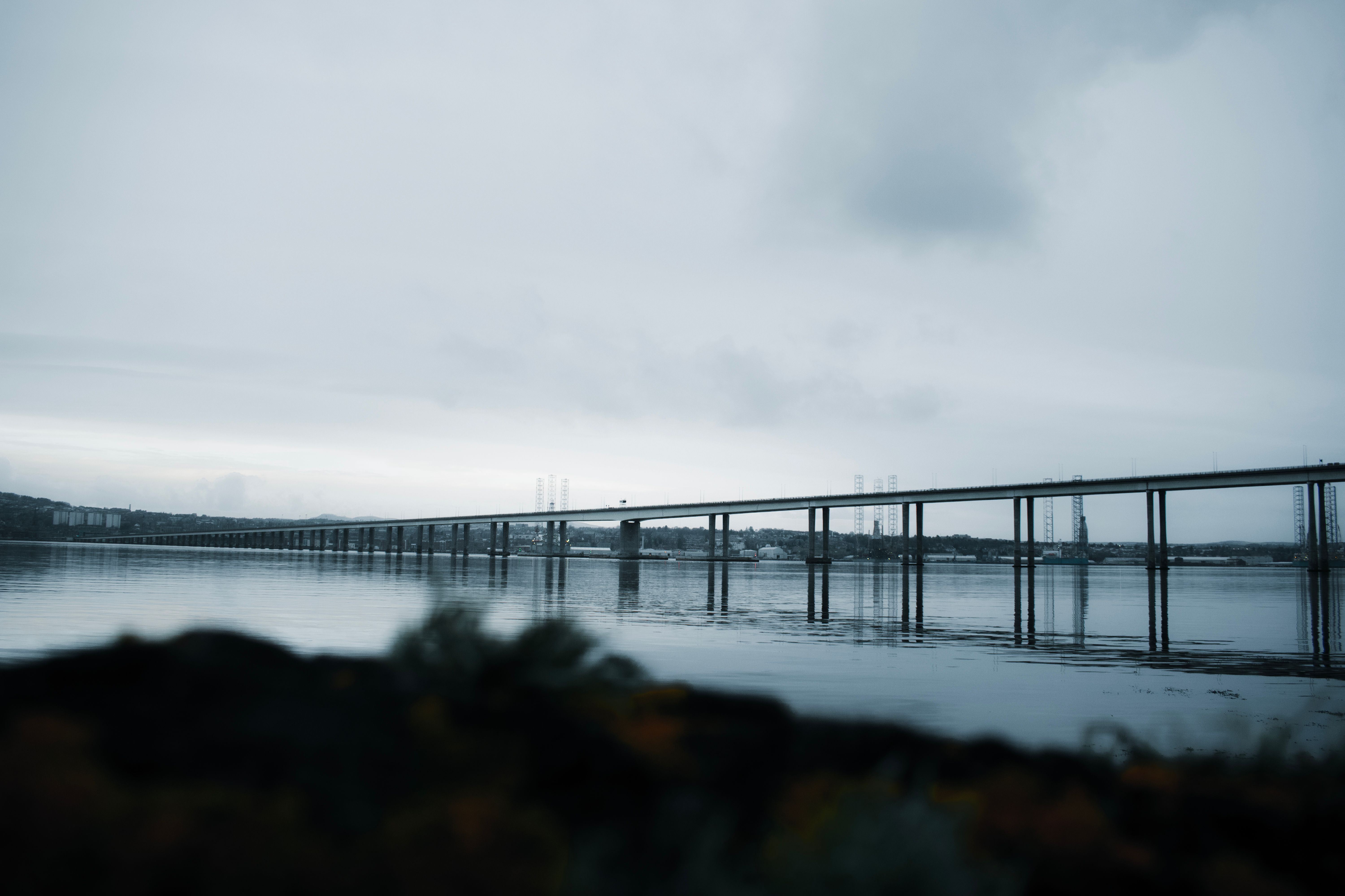 Scenic View of Long Bridge Over Calm Water · Free Stock Photo
