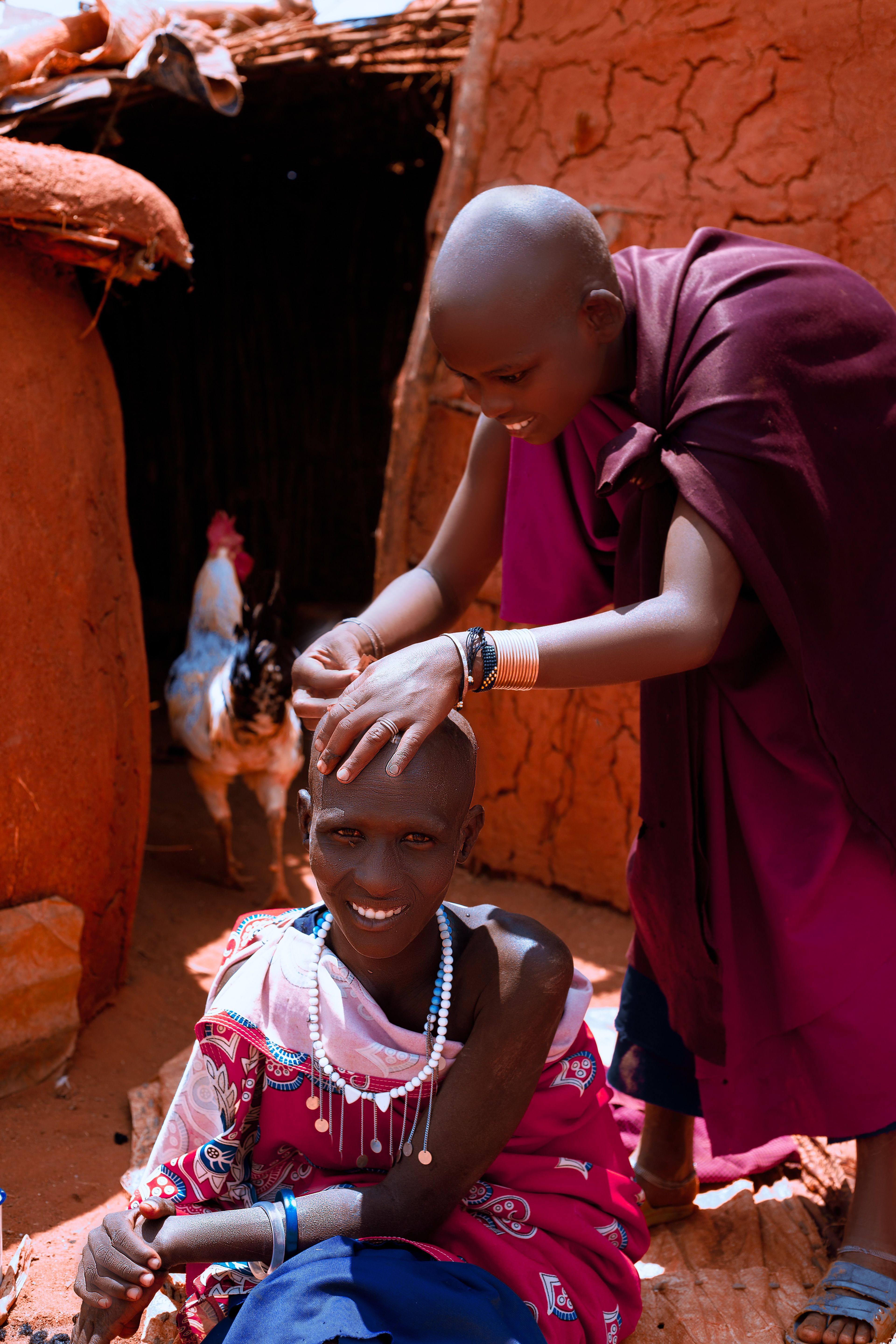 Traditional Maasai Hairstyles in Rustic Setting · Free Stock Photo