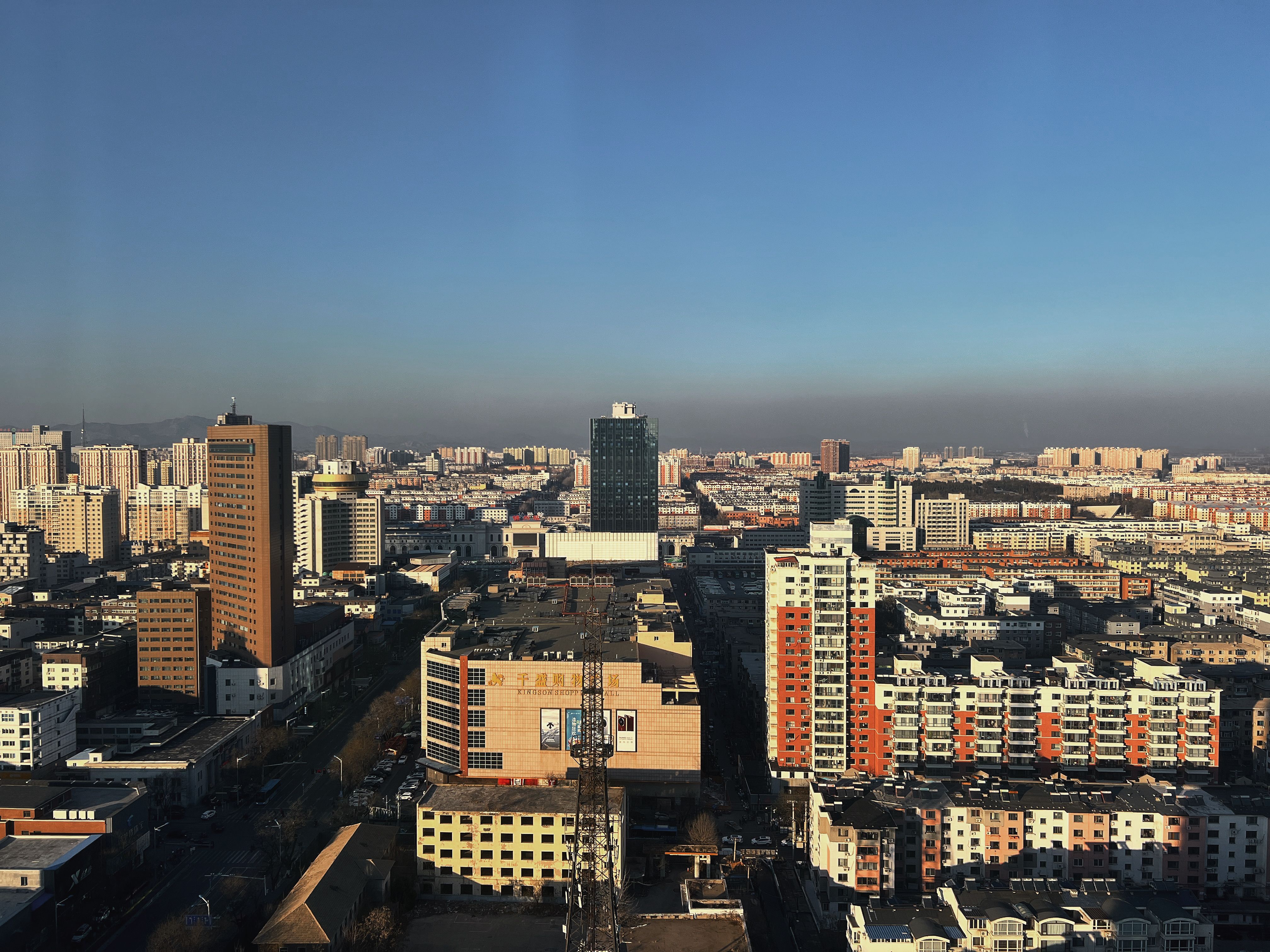 Aerial Cityscape with Skyscrapers and Clear Sky · Free Stock Photo