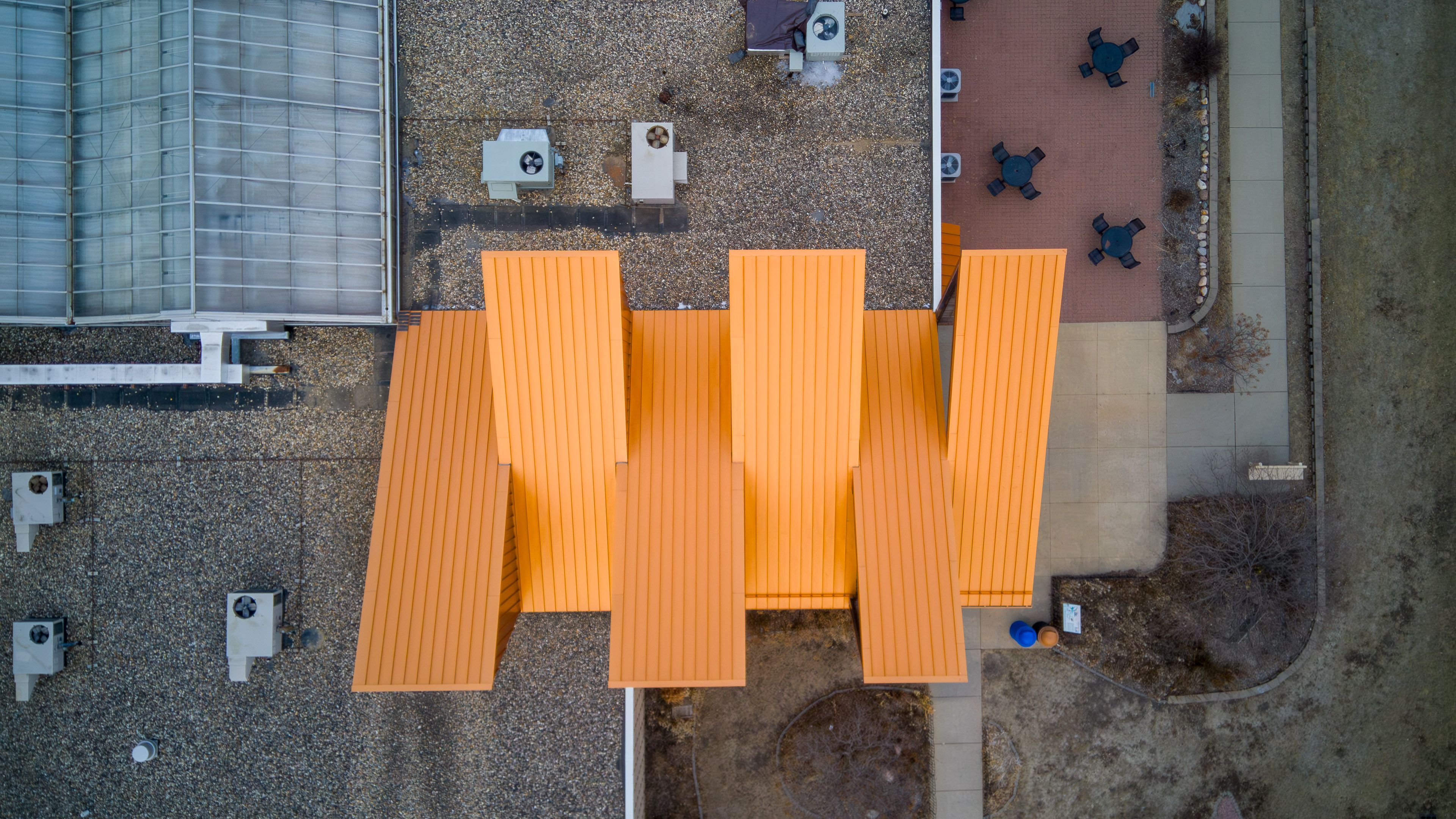 Aerial View of Modern Orange Roof Architecture · Free Stock Photo