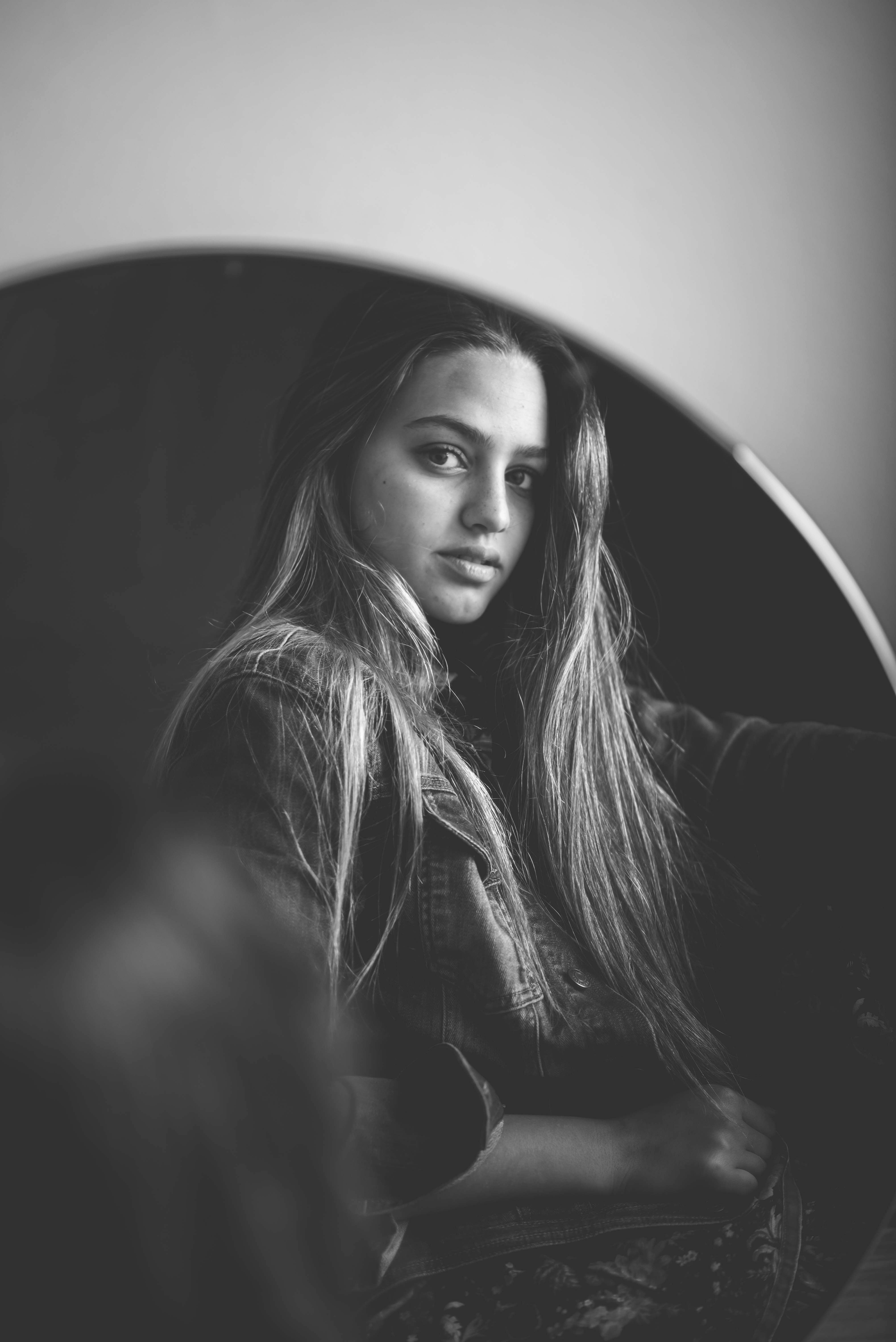 Monochrome Portrait of a Reflective Woman · Free Stock Photo