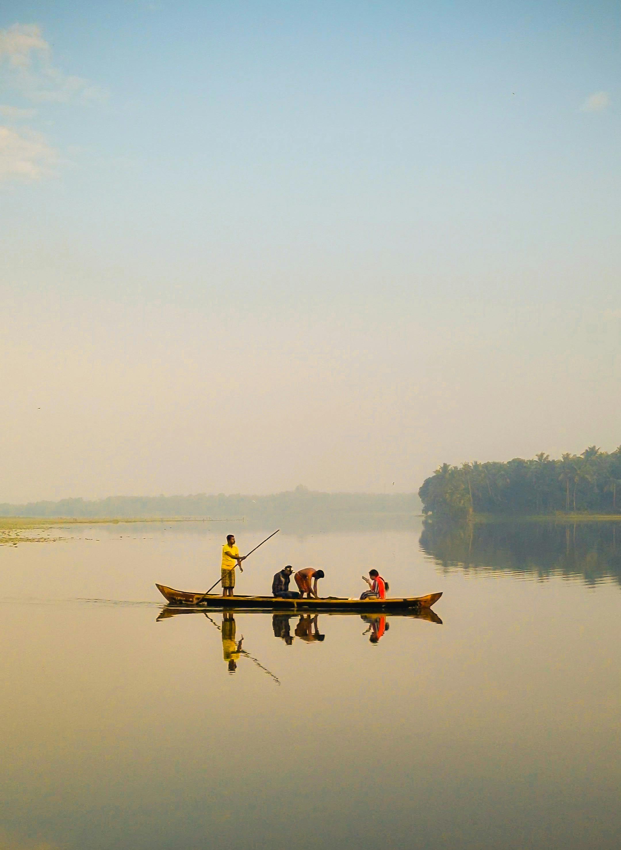 Tranquil Canoe Ride at Vellayani Lake Kerala · Free Stock Photo