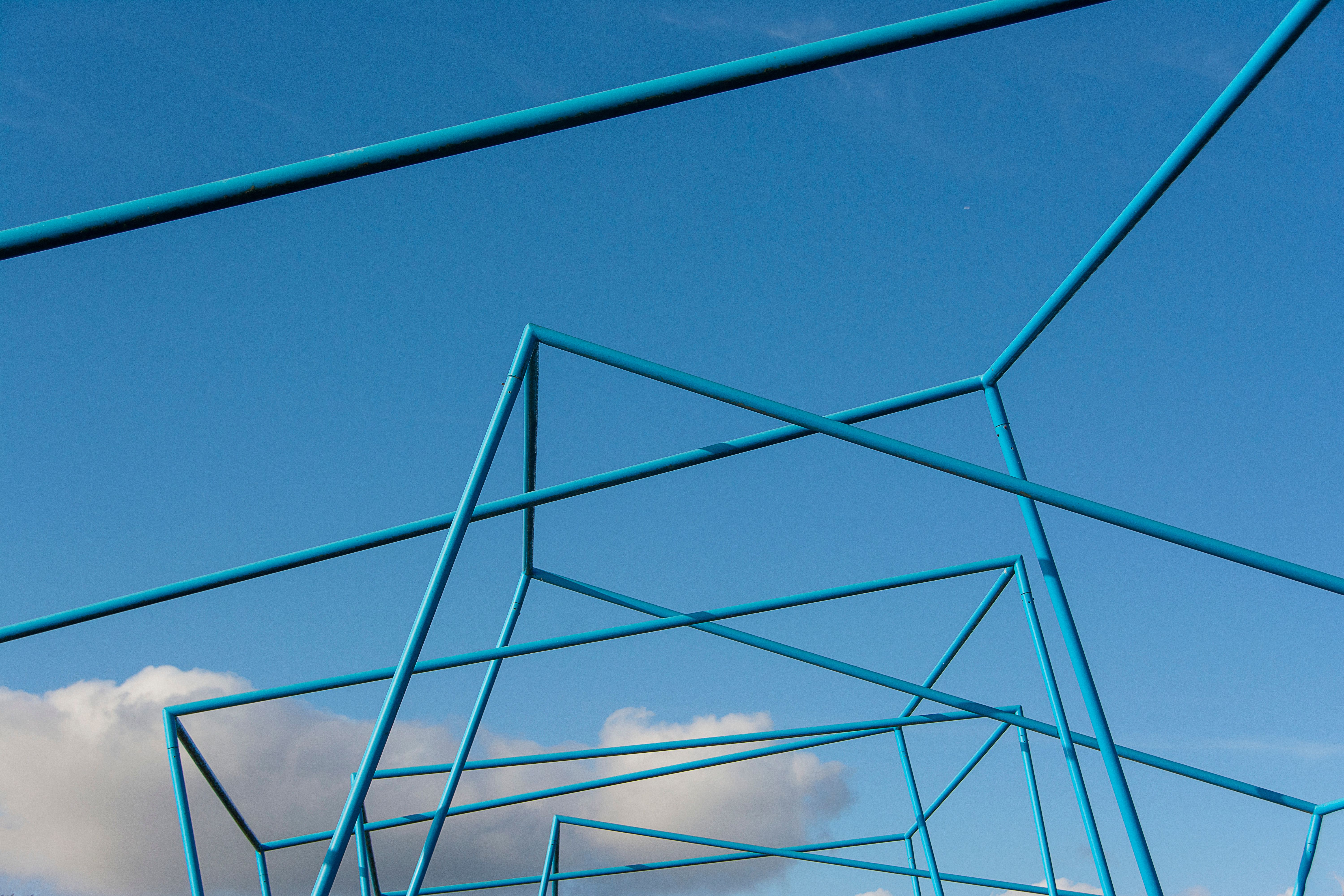 Abstract Blue Metal Geometric Structure Outdoors · Free Stock Photo
