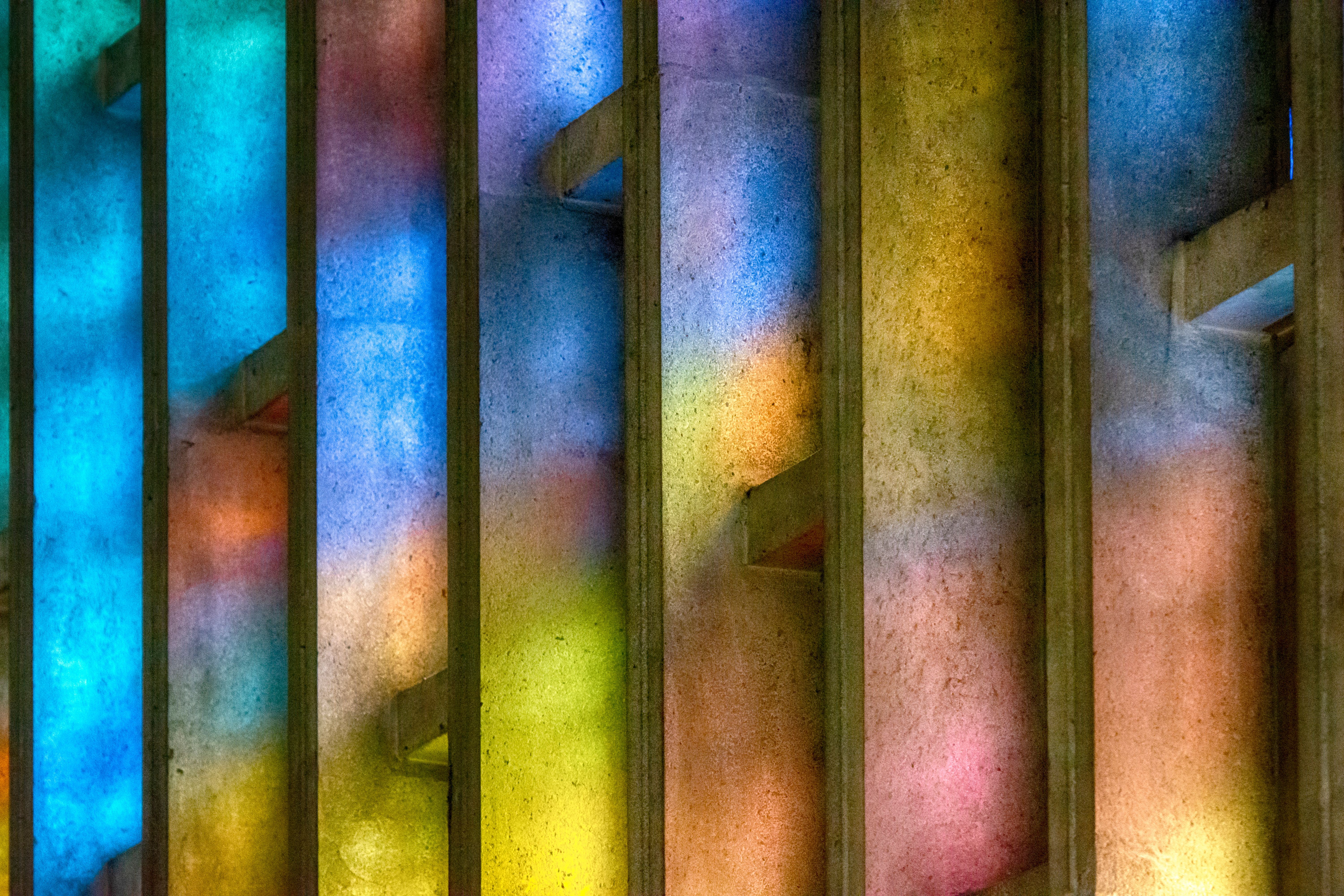 Colorful Light Patterns on Concrete Walls · Free Stock Photo