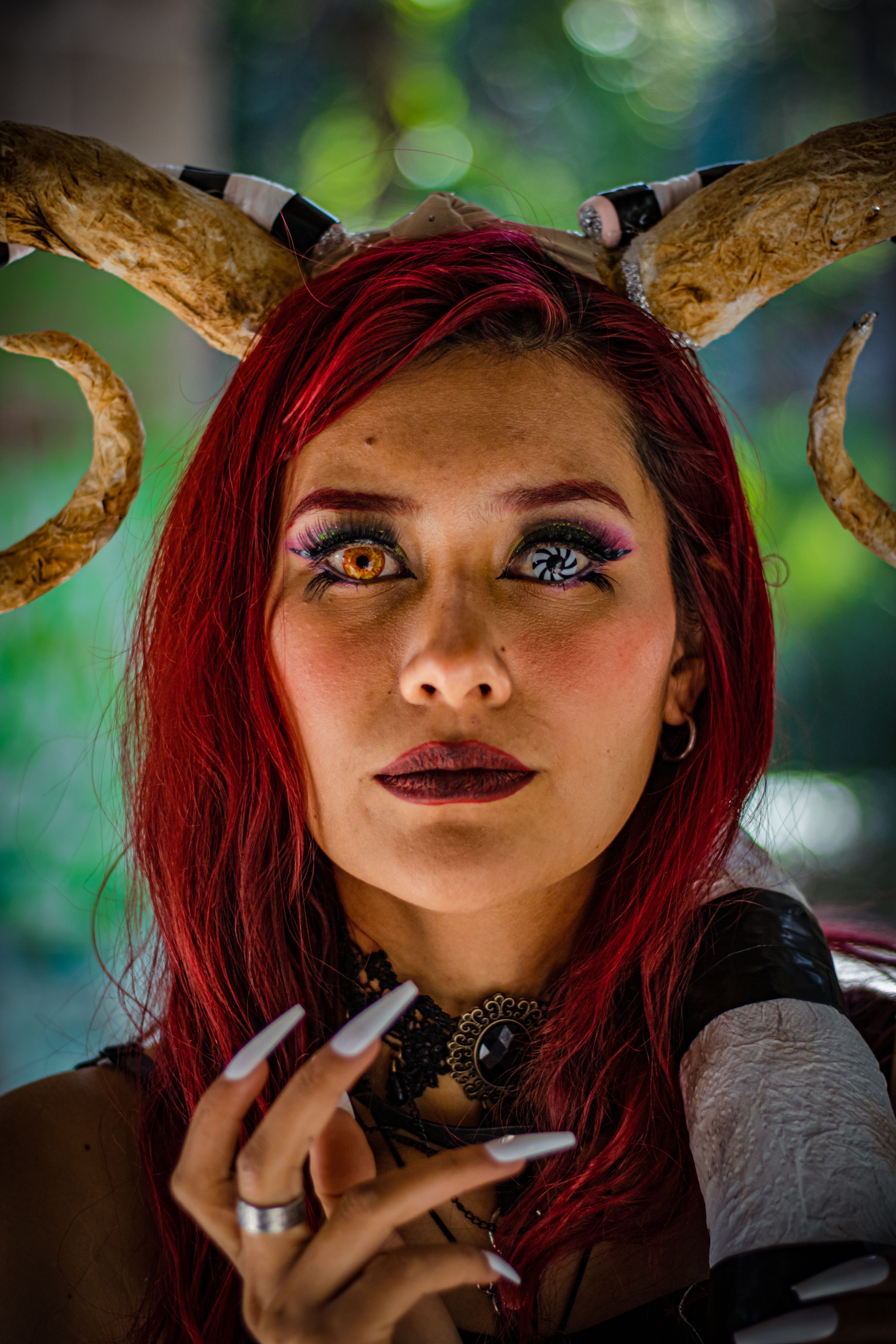 Creative Cosplay with Horns and Artistic Makeup · Free Stock Photo