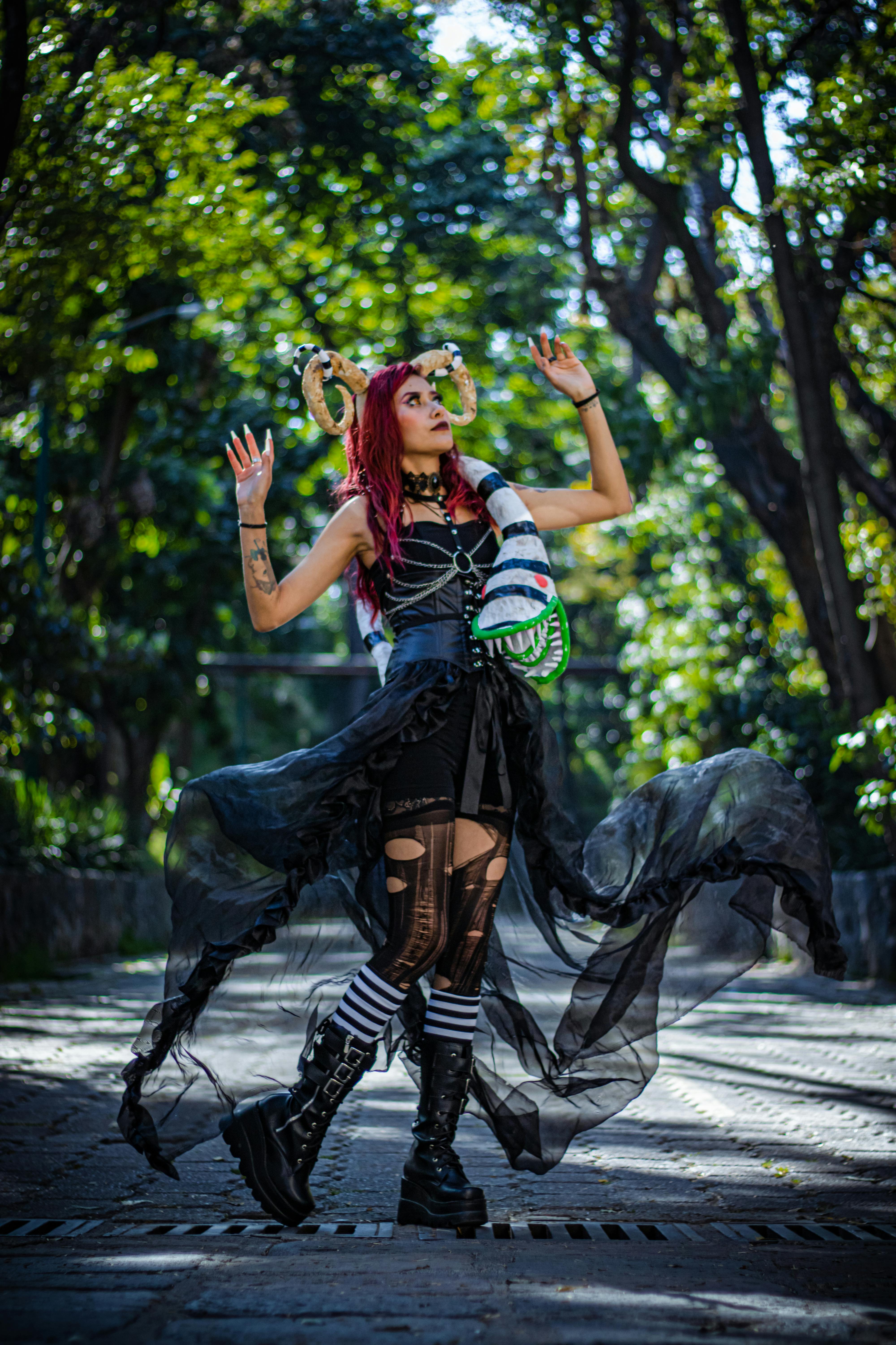 Creative Cosplay in Black Dress Outdoors · Free Stock Photo