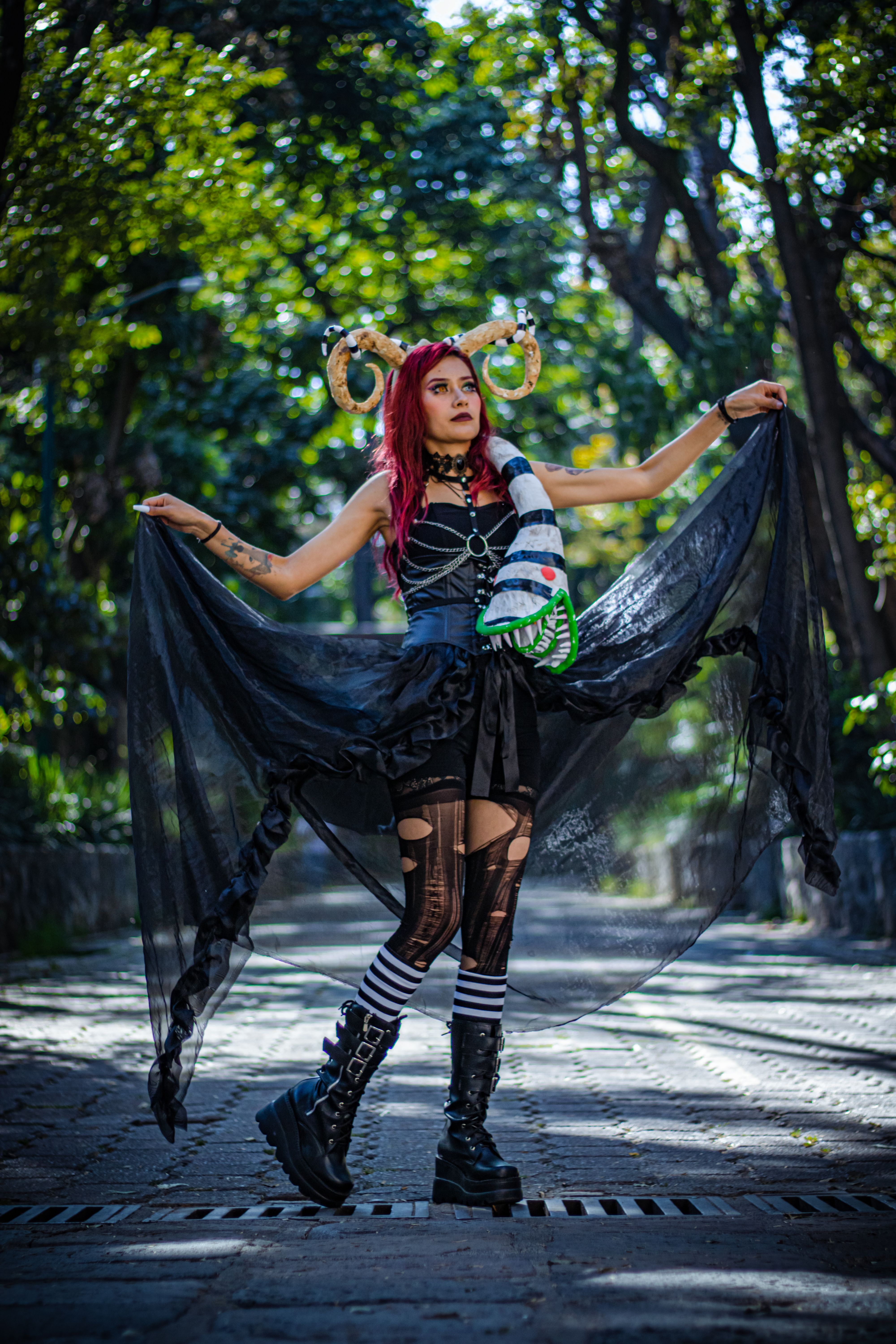 Artistic Cosplay in a Forested Park Setting · Free Stock Photo