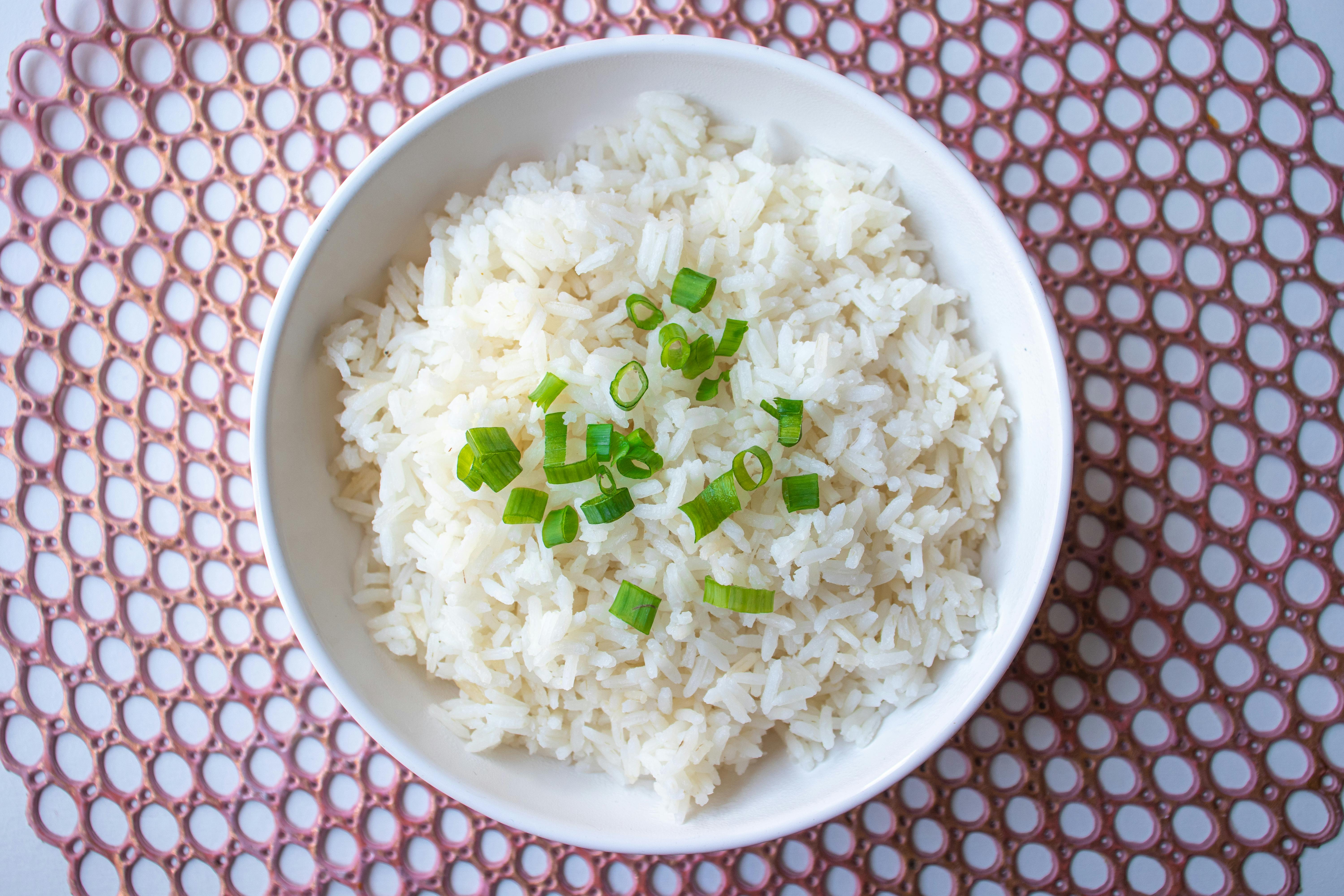 White Rice in Bowl with Green Onions Top View · Free Stock Photo