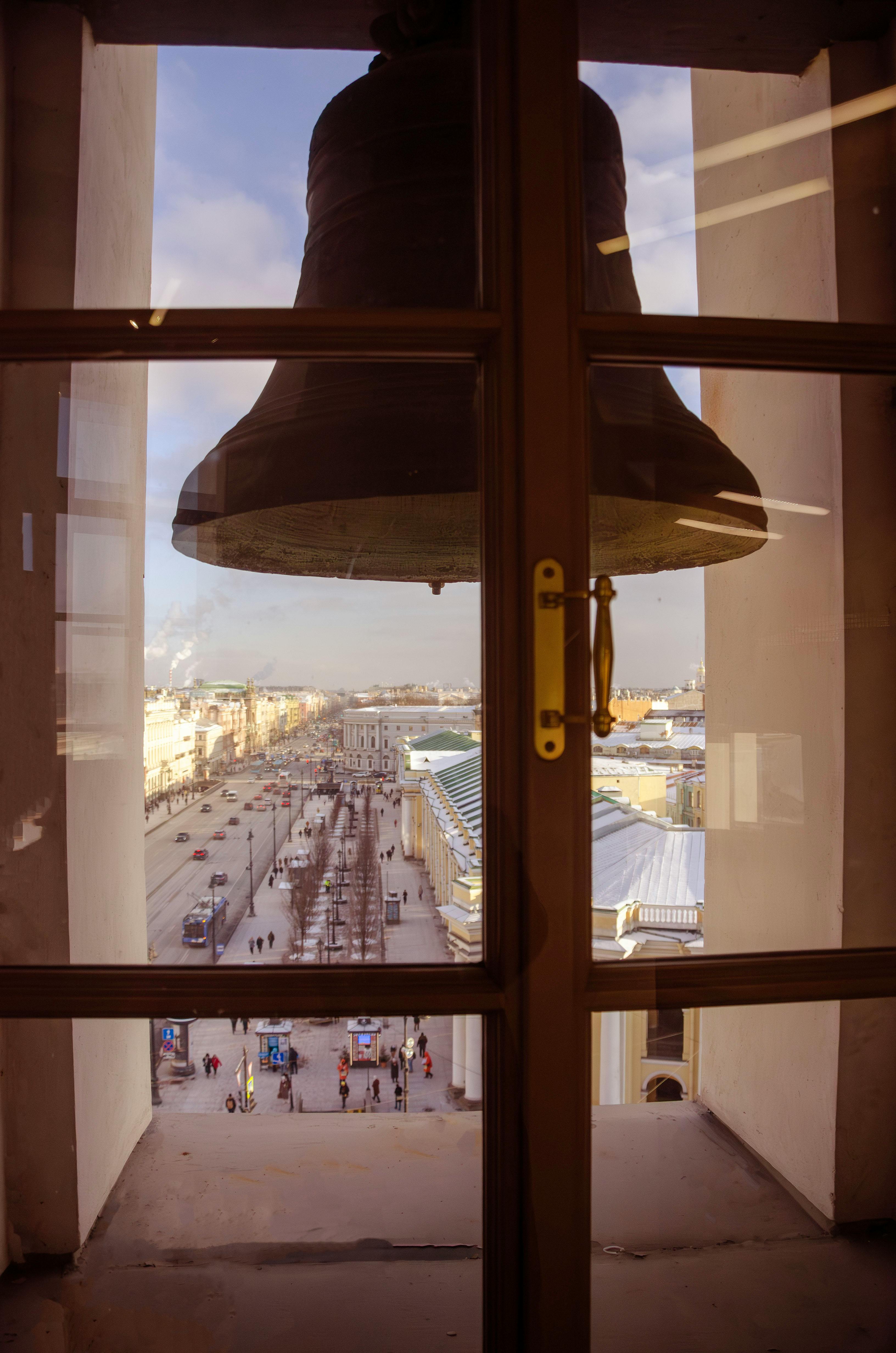 Cityscape View Through Tower Bell Window · Free Stock Photo