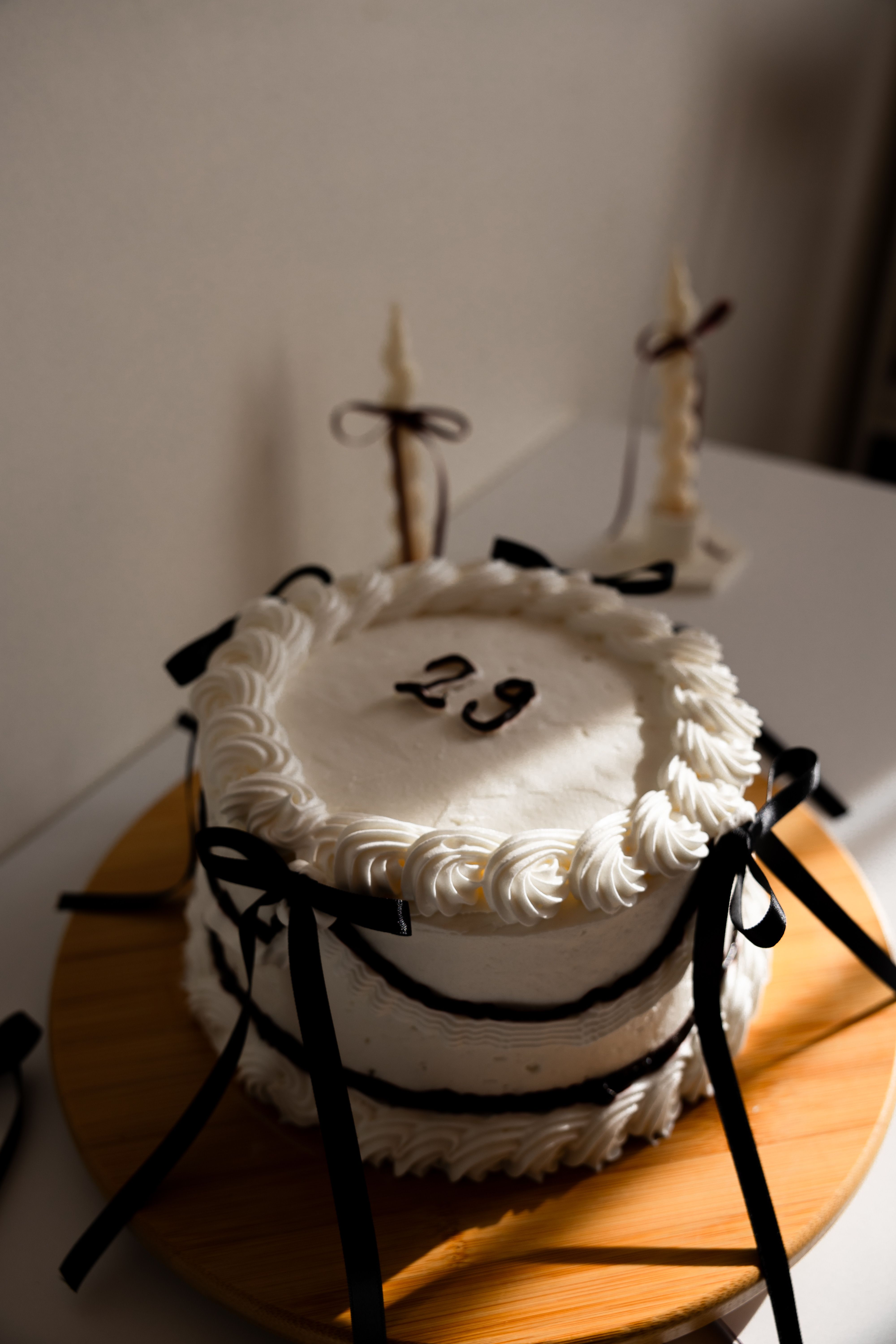 Elegant Black Ribbon 29th Birthday Cake · Free Stock Photo
