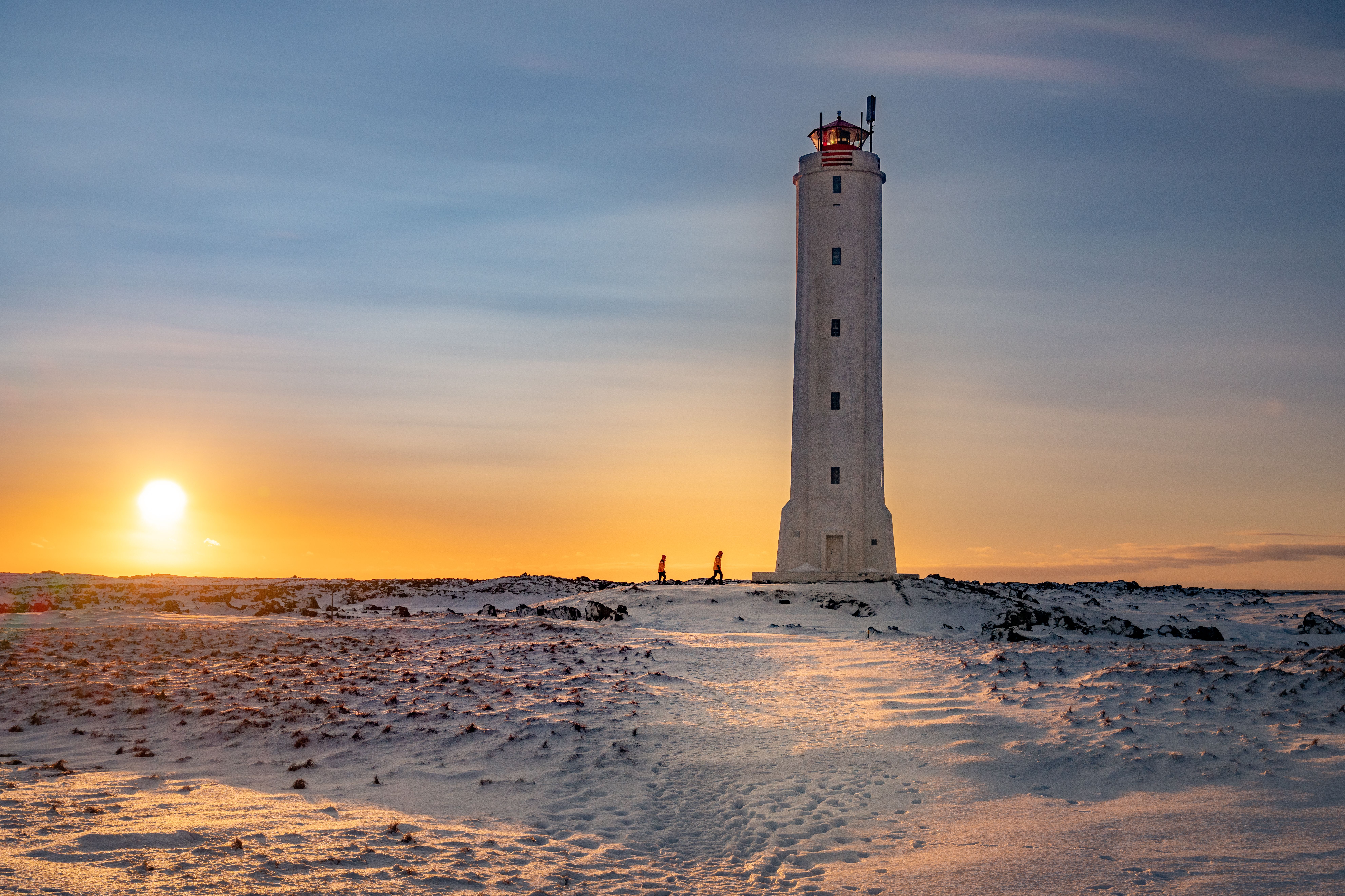 Stunning Winter Sunset at Lighthouse on Island · Free Stock Photo
