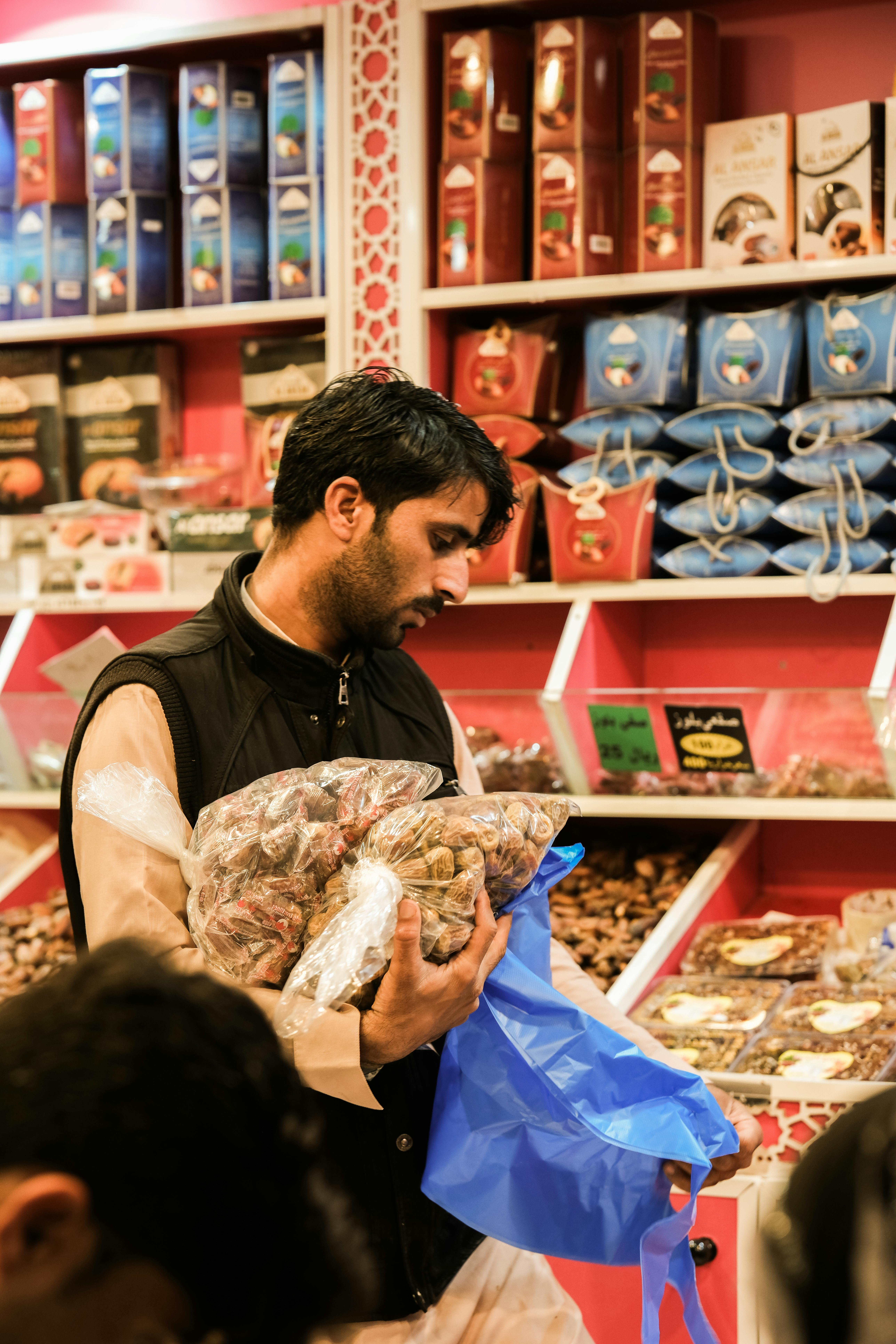 Busy Market Scene with Shopper in Saudi Arabia · Free Stock Photo