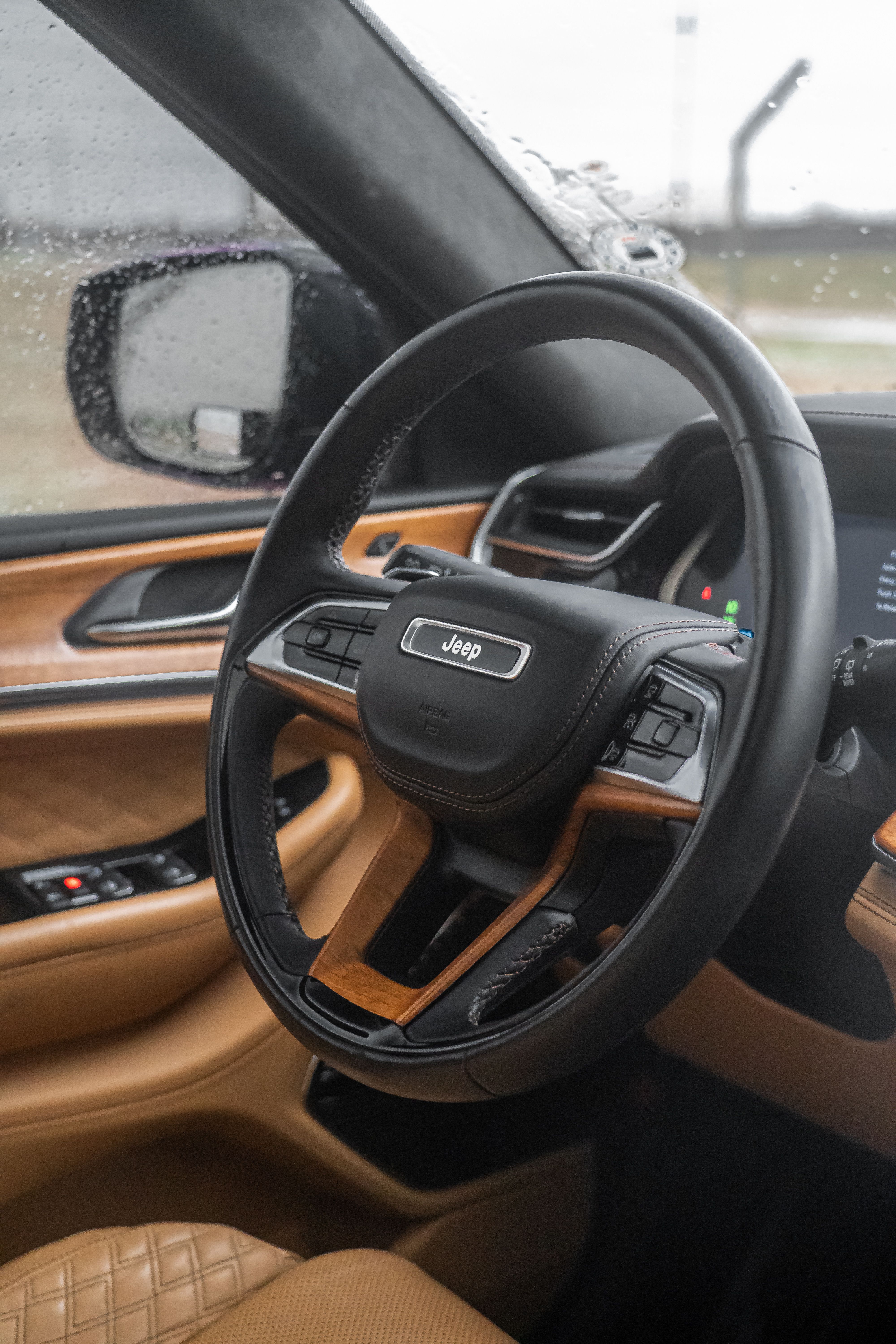 Luxury SUV Interior on a Rainy Day · Free Stock Photo
