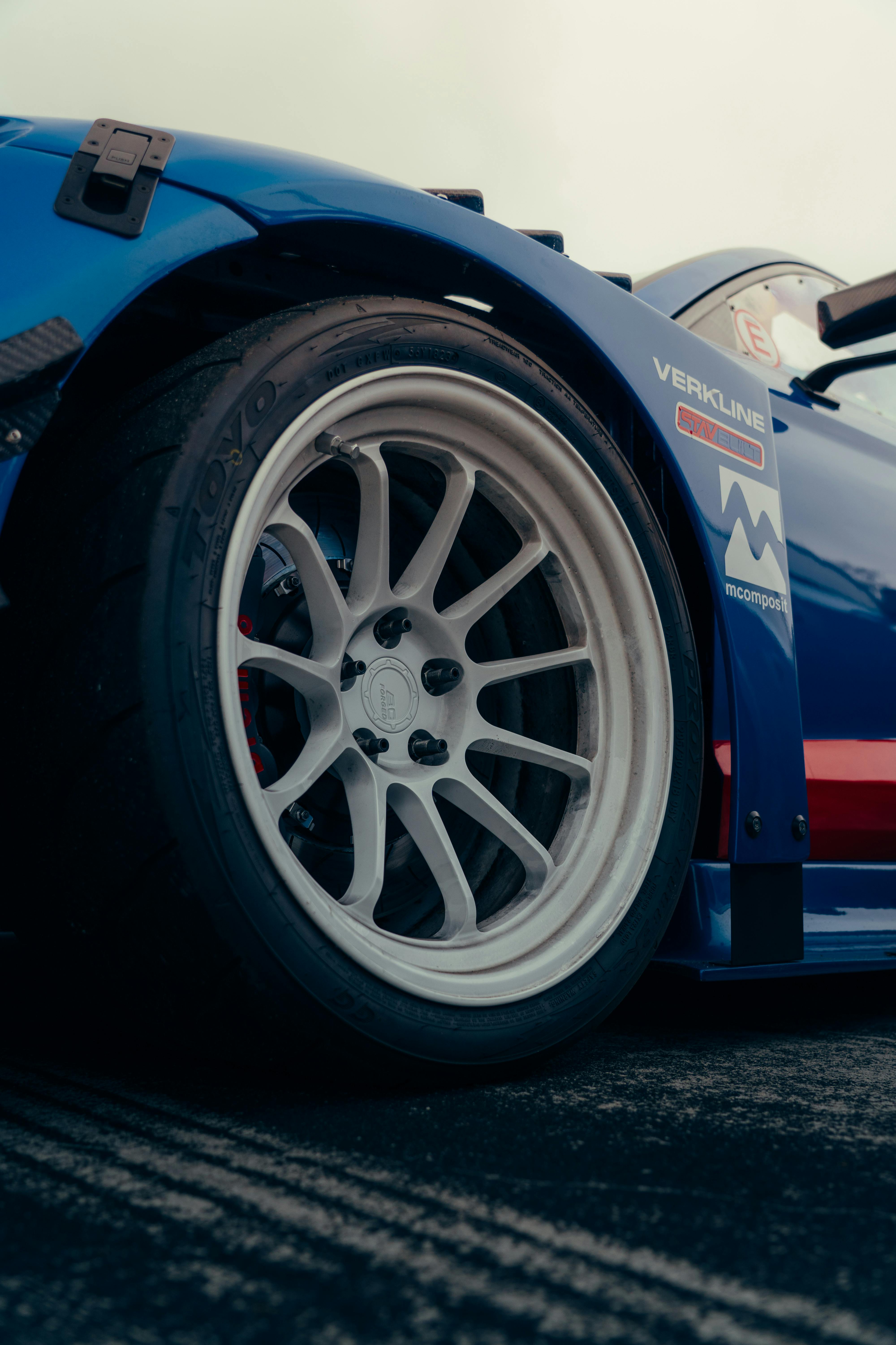 Close-up of Race Car Wheel in Motion · Free Stock Photo